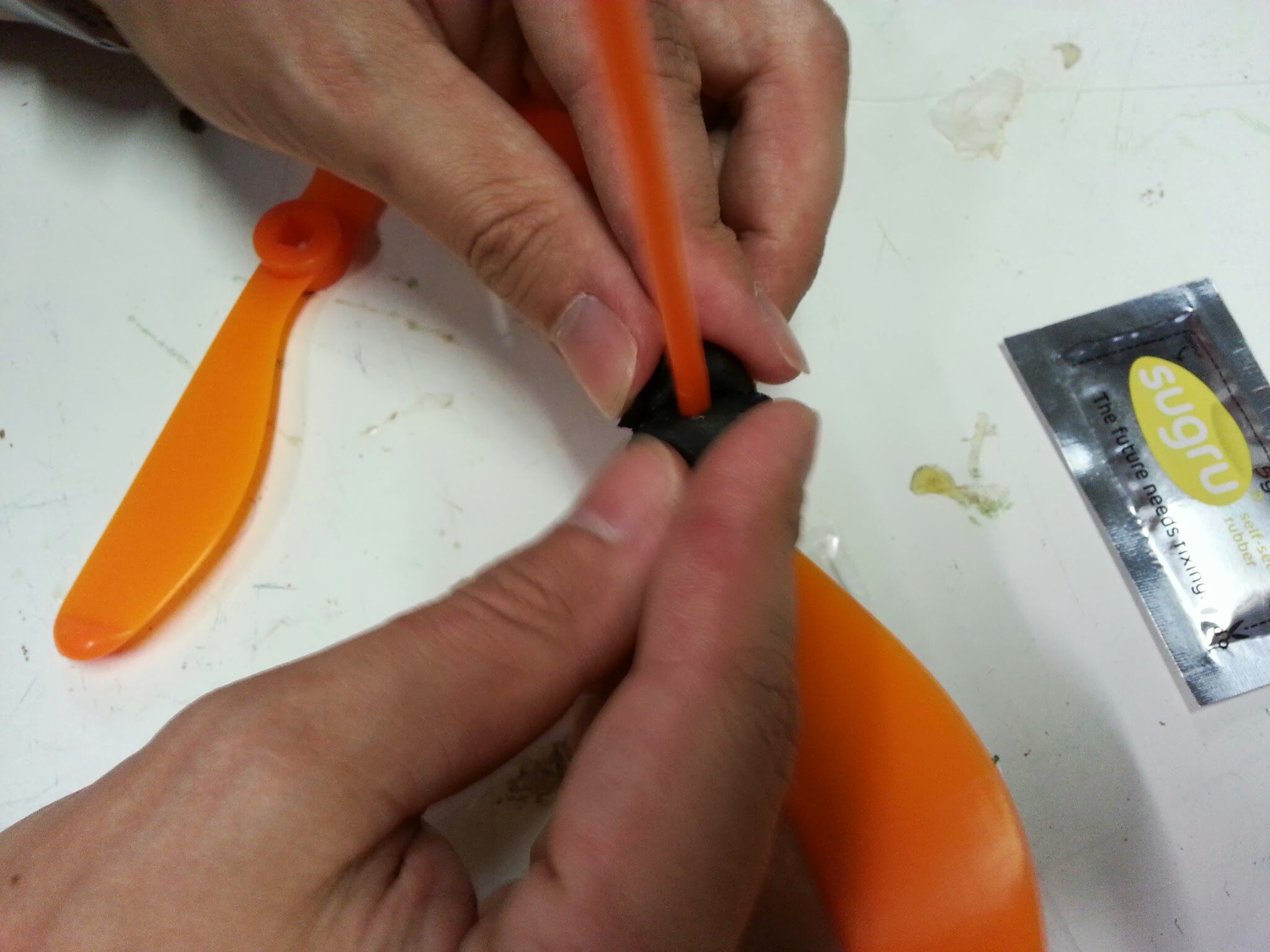 Use Sugru to Upgrade a Hand Copter Toy - Instructables
