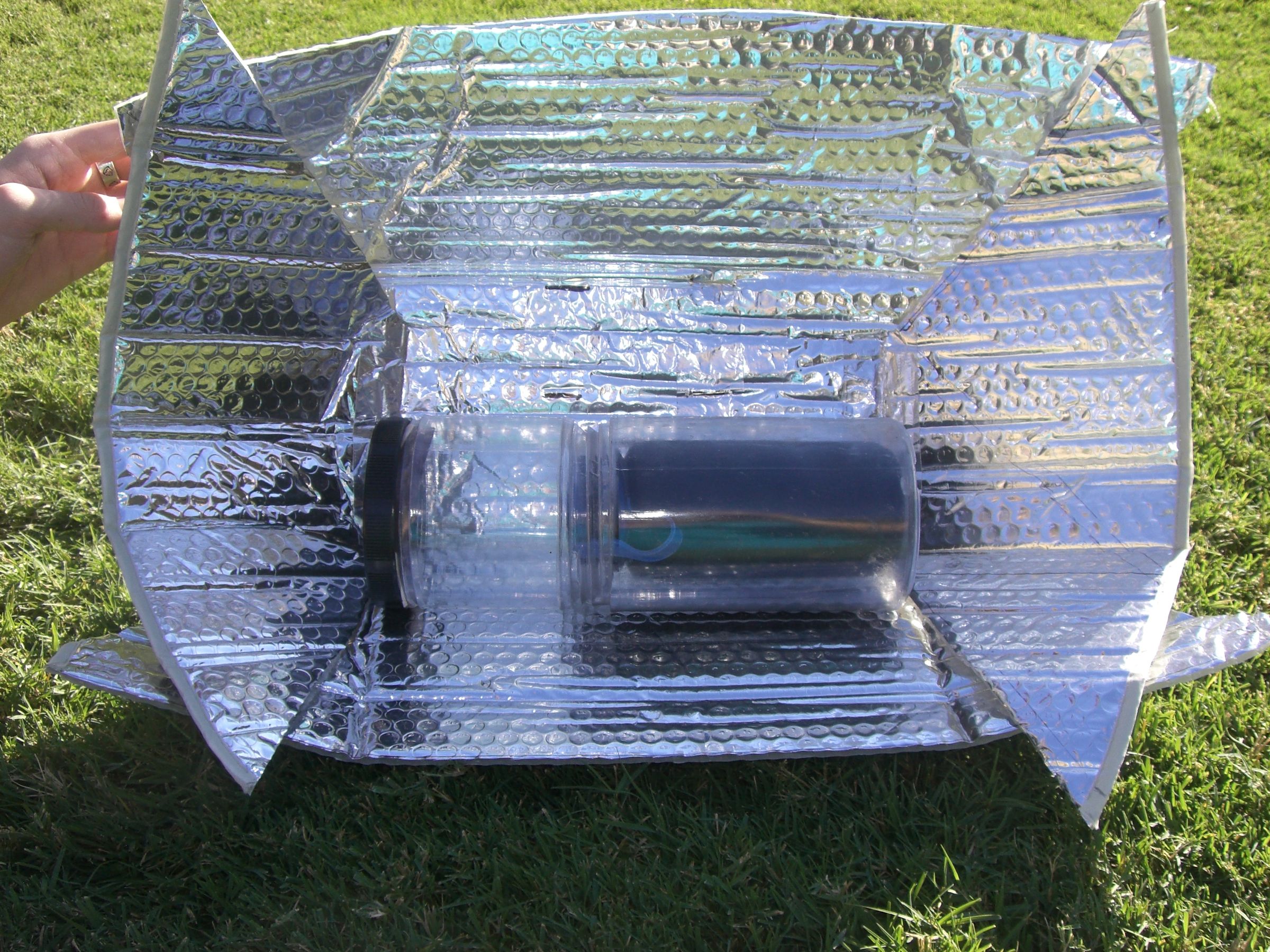 Solar Water Heater for Backpacking Using Water Bottles and a Car Shade ...