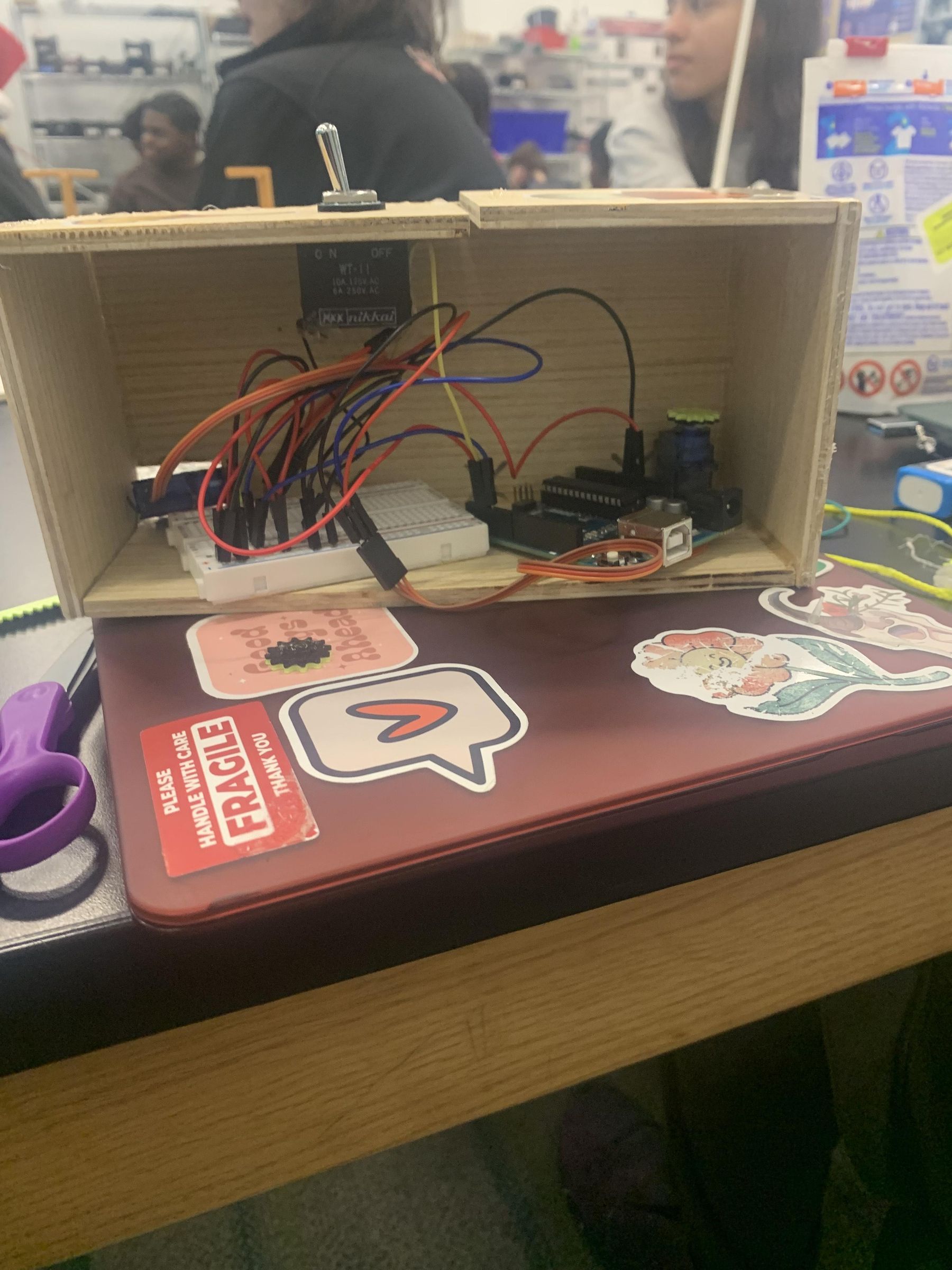 The Useless Machine : 7 Steps - Instructables