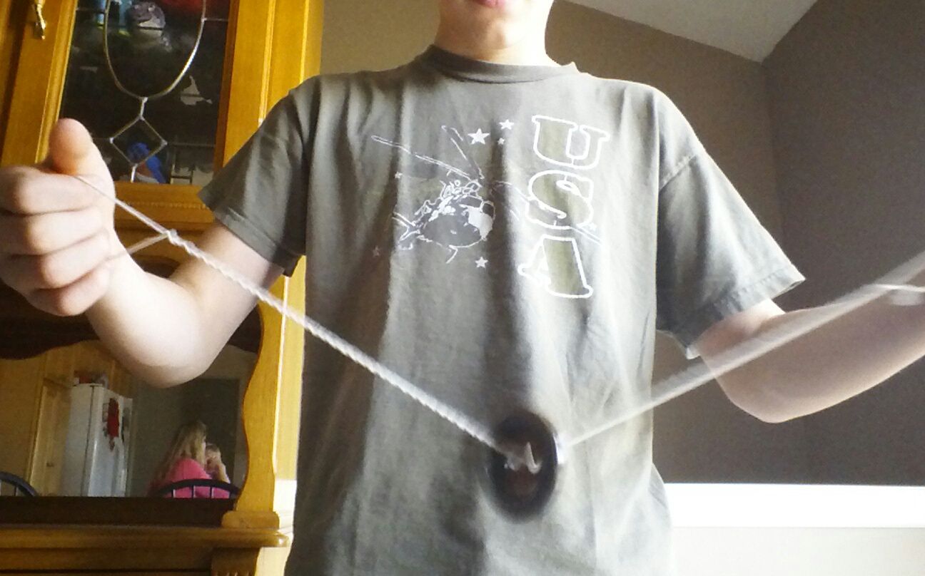 Spinning Button Toy : 6 Steps - Instructables