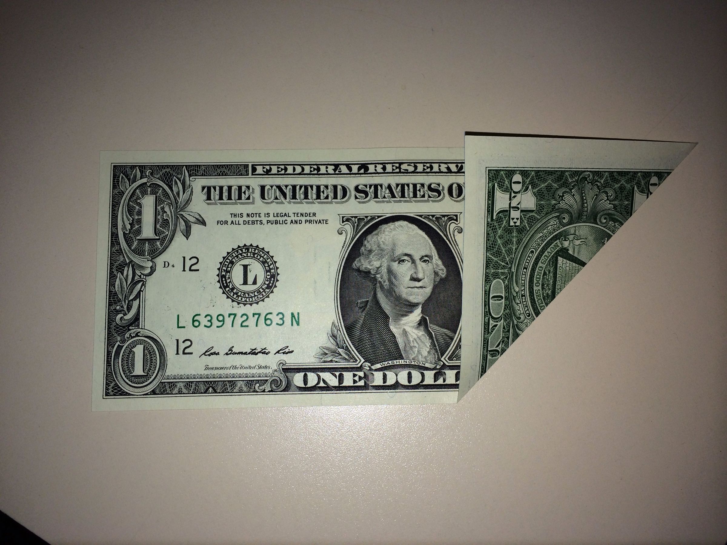 Dollar Origami Heart Holding Quarter : 11 Steps - Instructables