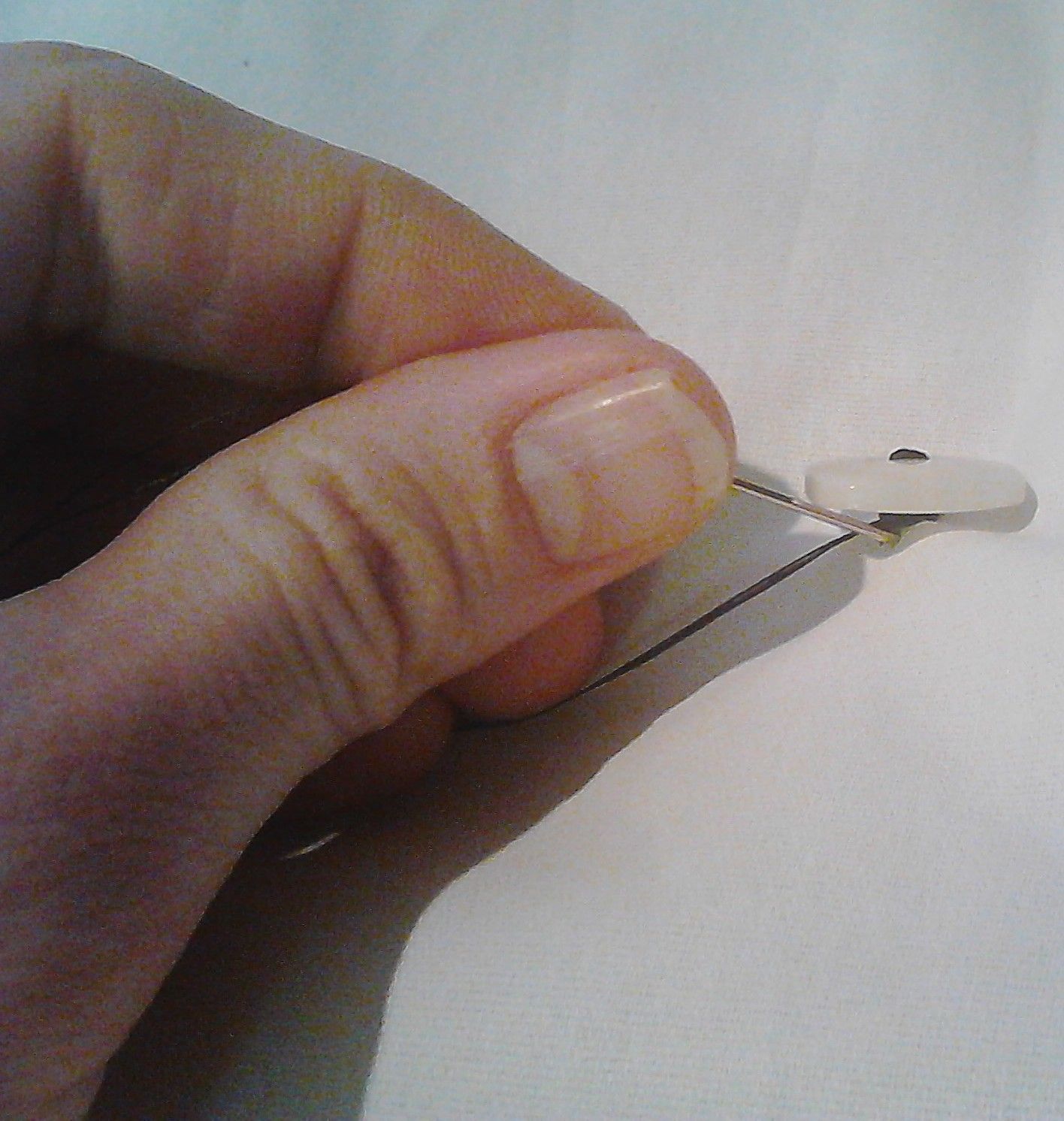 How to Professionally Sew on a Button by Hand : 14 Steps - Instructables