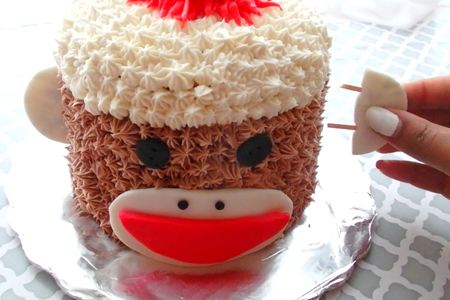 Pink Sock Monkey Birthday Cake