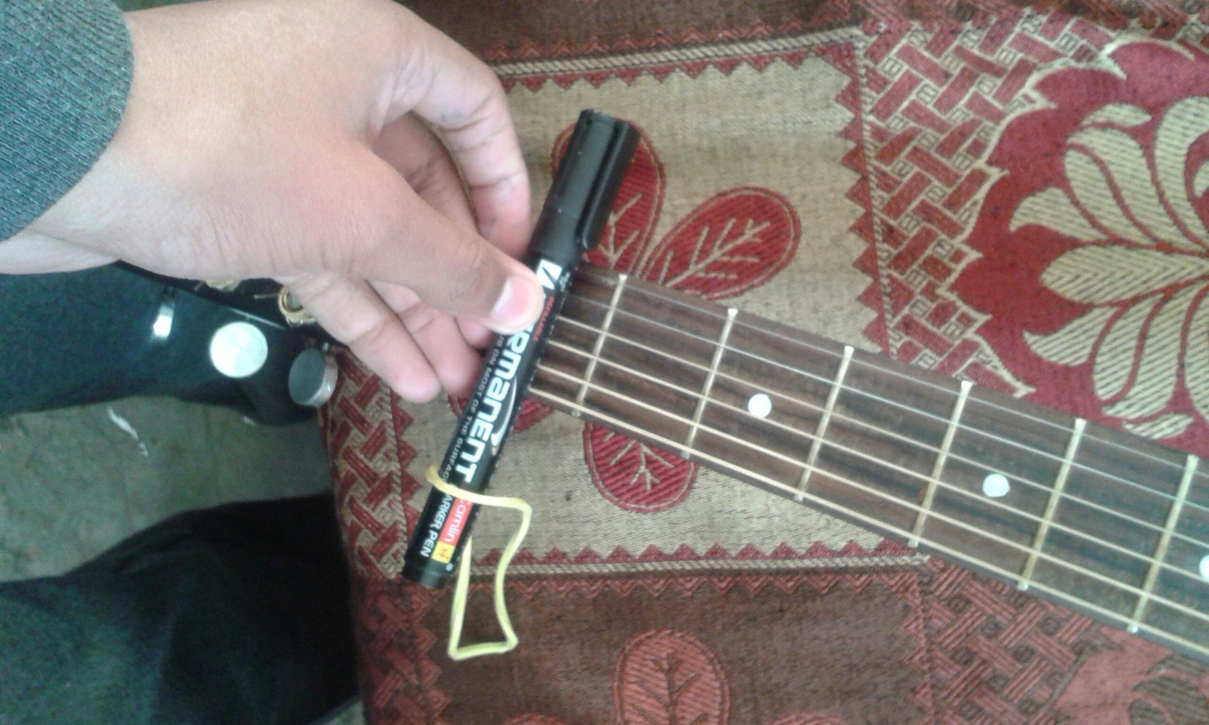 A Cheap Guitar Capo - Instructables
