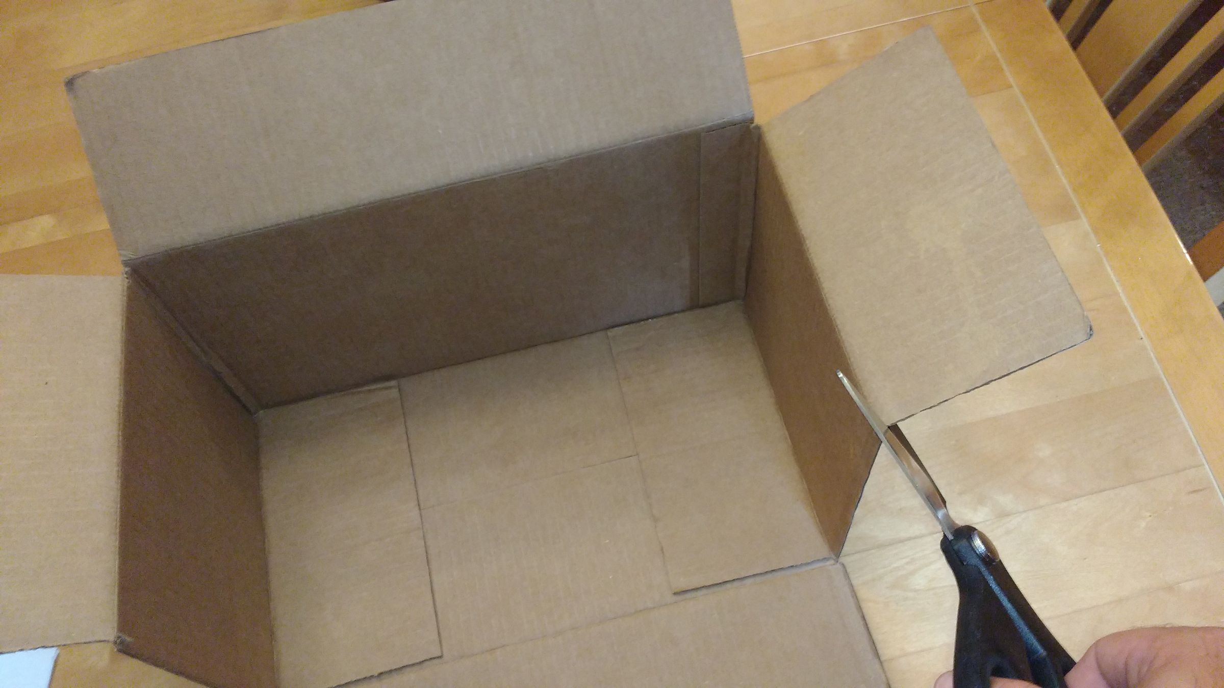Make a Free/Inexpensive Fishing Rod Wrapping Jig Out of a Cardboard Box ...