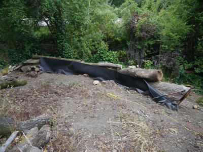 Tree Trunk Retaining Wall - Instructables
