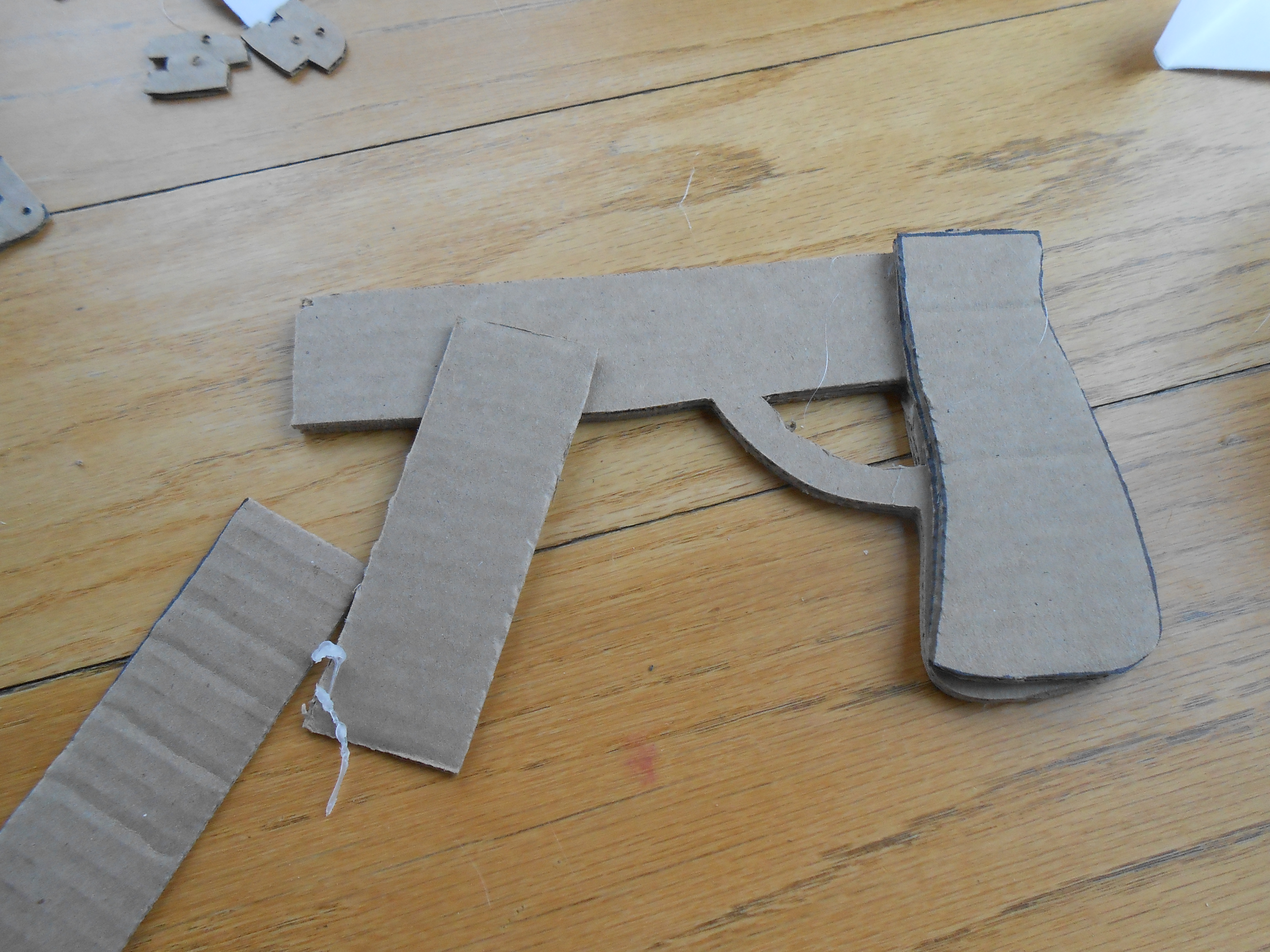 Cardboard Rubberband Gun : 4 Steps - Instructables
