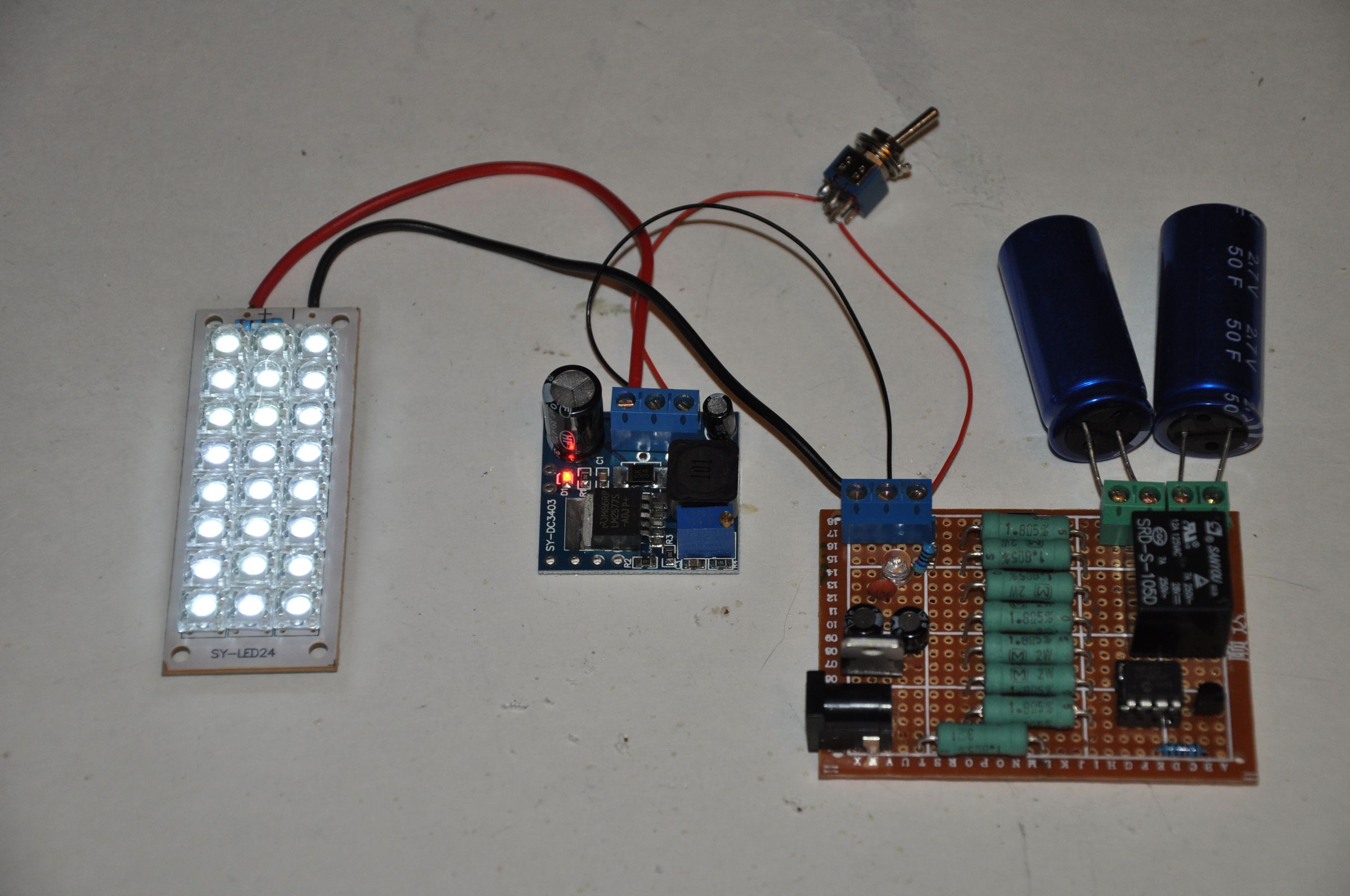 The Super Capacitor Flashlight With Custom Charger and Voltage Booster ...