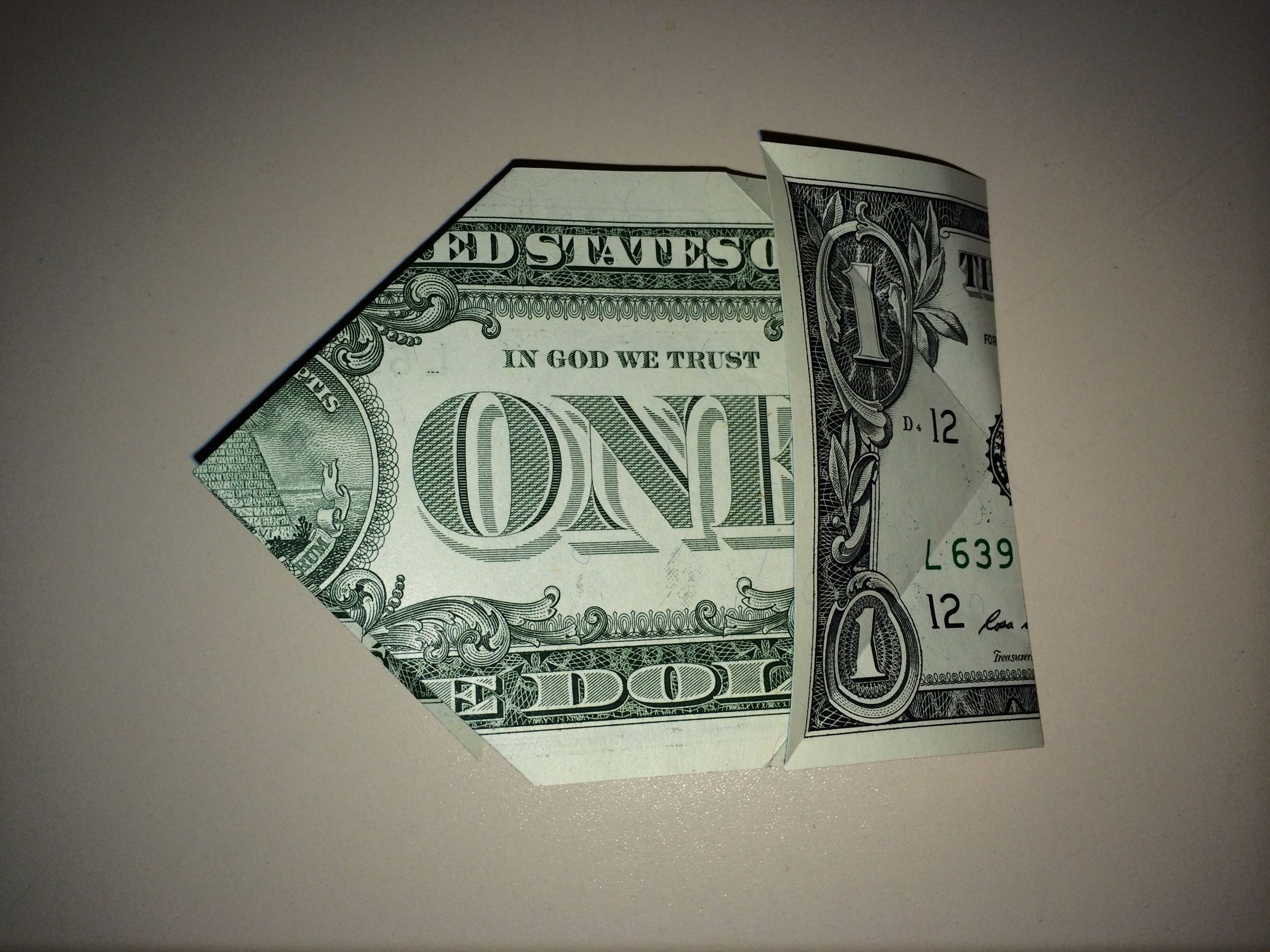 Dollar Origami Heart Holding Quarter : 11 Steps - Instructables