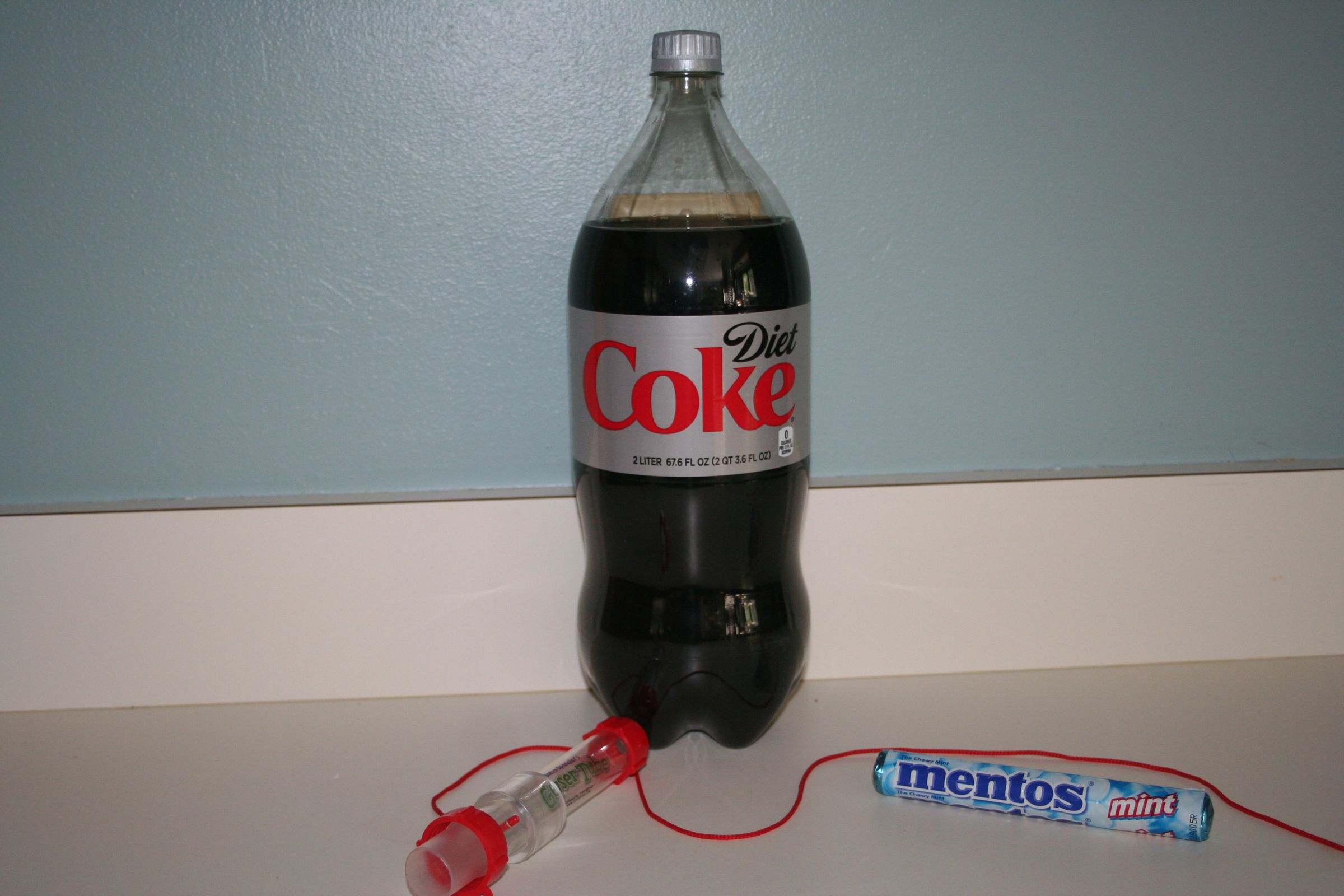 Mentos and Coke With "Geyser Tube" : 4 Steps - Instructables