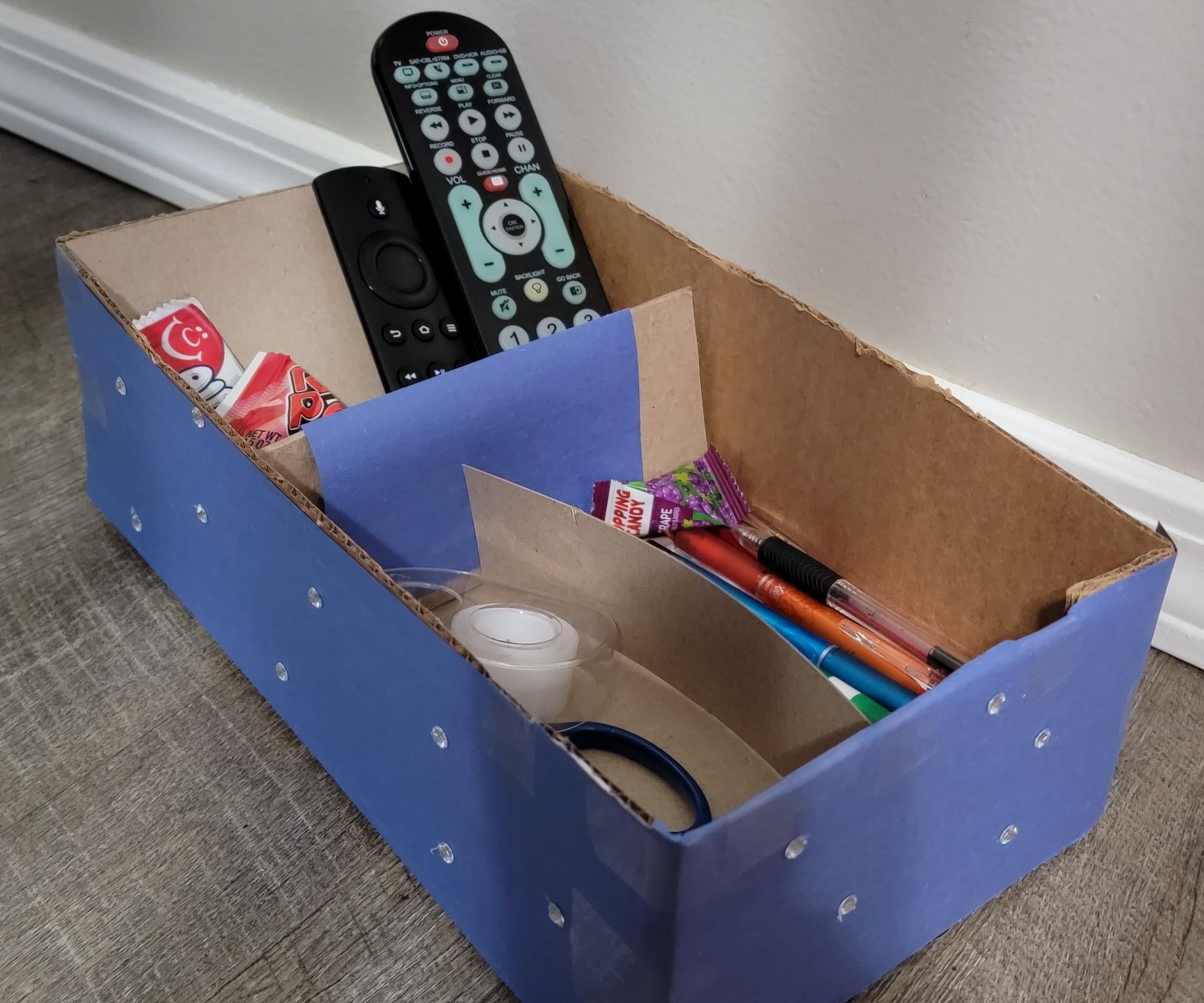 Remote and Phone Holder. : 3 Steps - Instructables