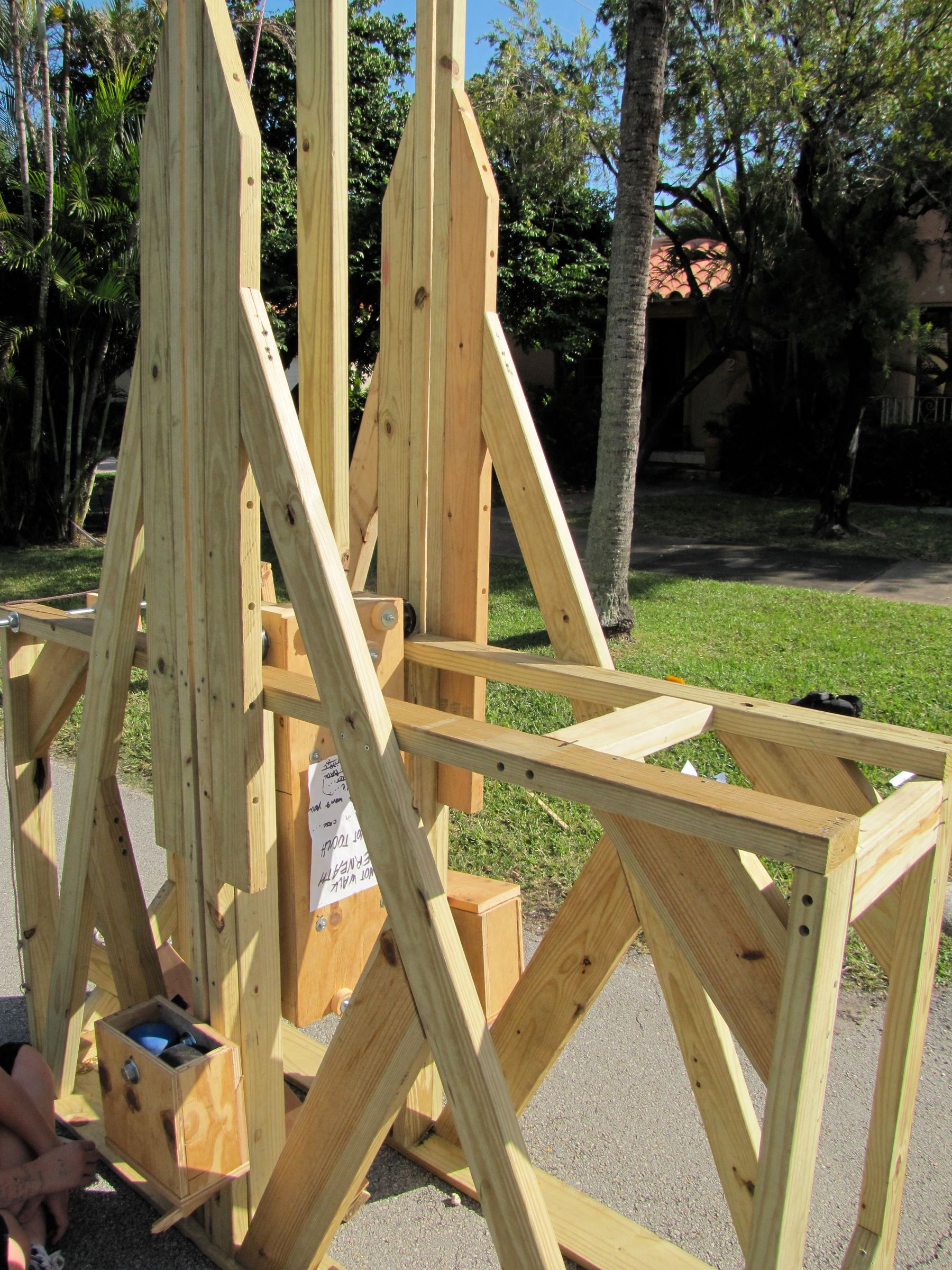 Floating Arm Trebuchet Simulator