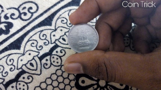 Rolling Coin Across Your Fingers! Coin Trick : 5 Steps - Instructables