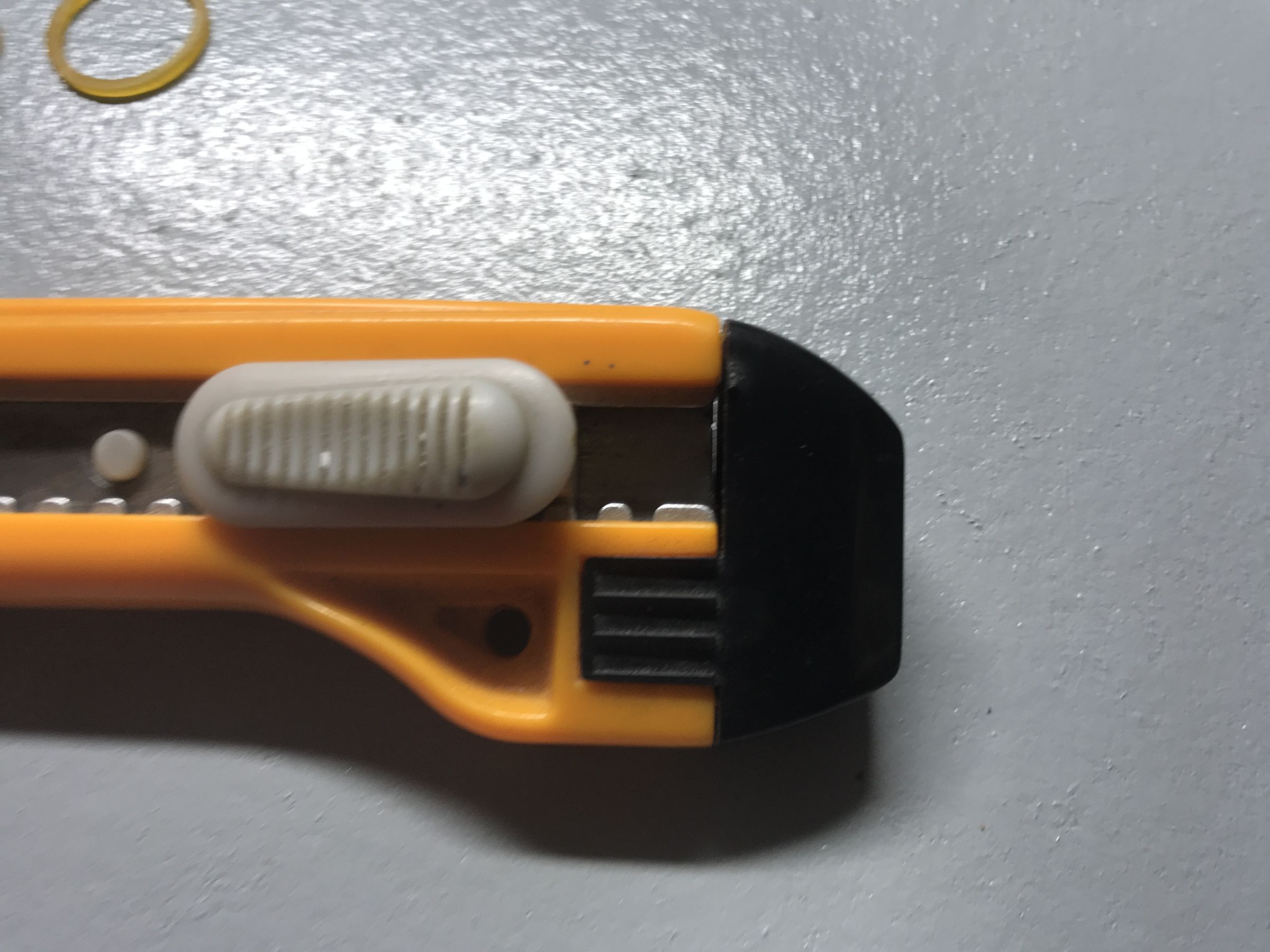 Self Retracting Box Cutter Using Rubber Band : 4 Steps - Instructables