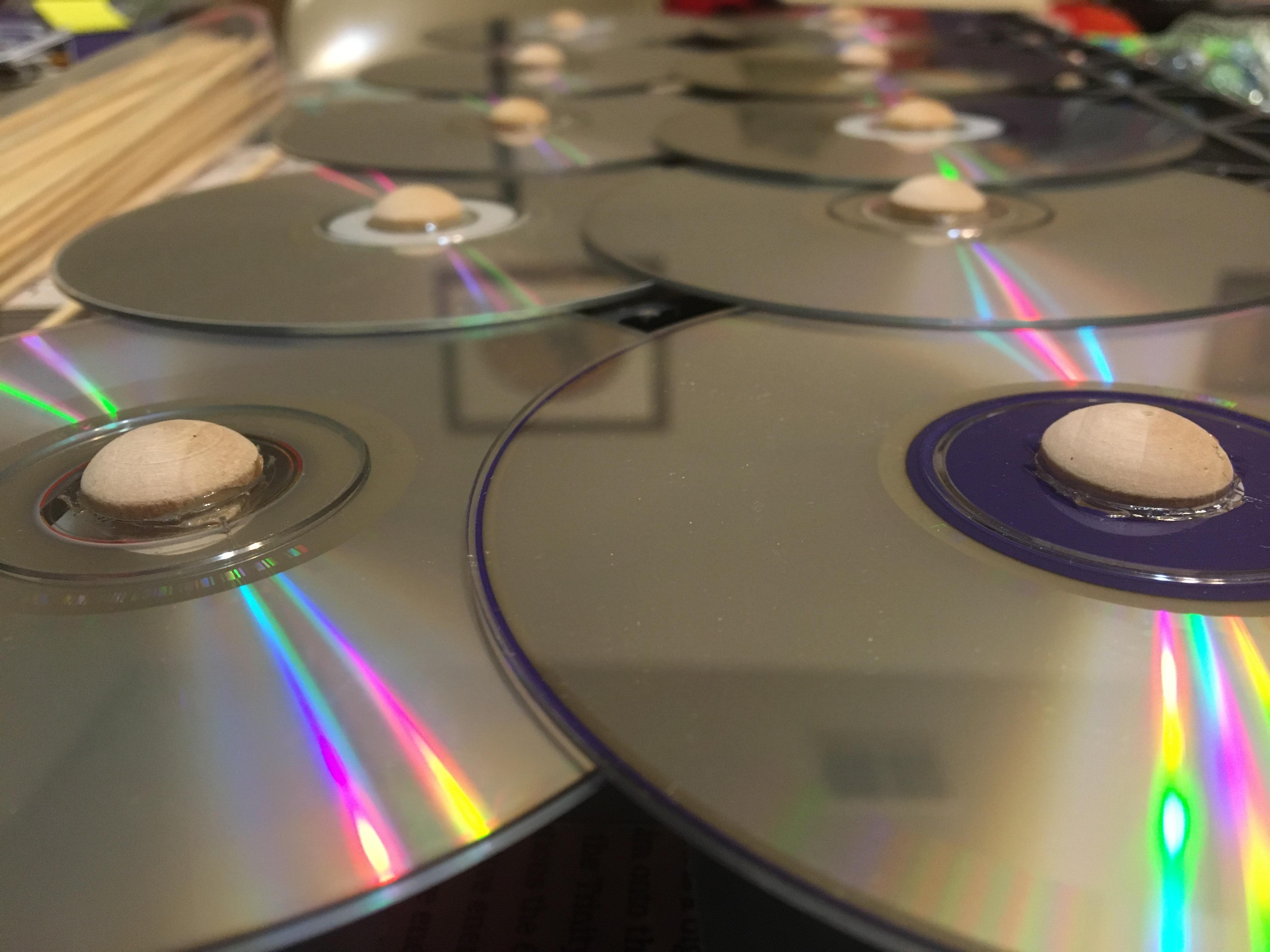 Simple 5 Minute Spin Top From a CD, a Marble or a Wood Button Plug and ...