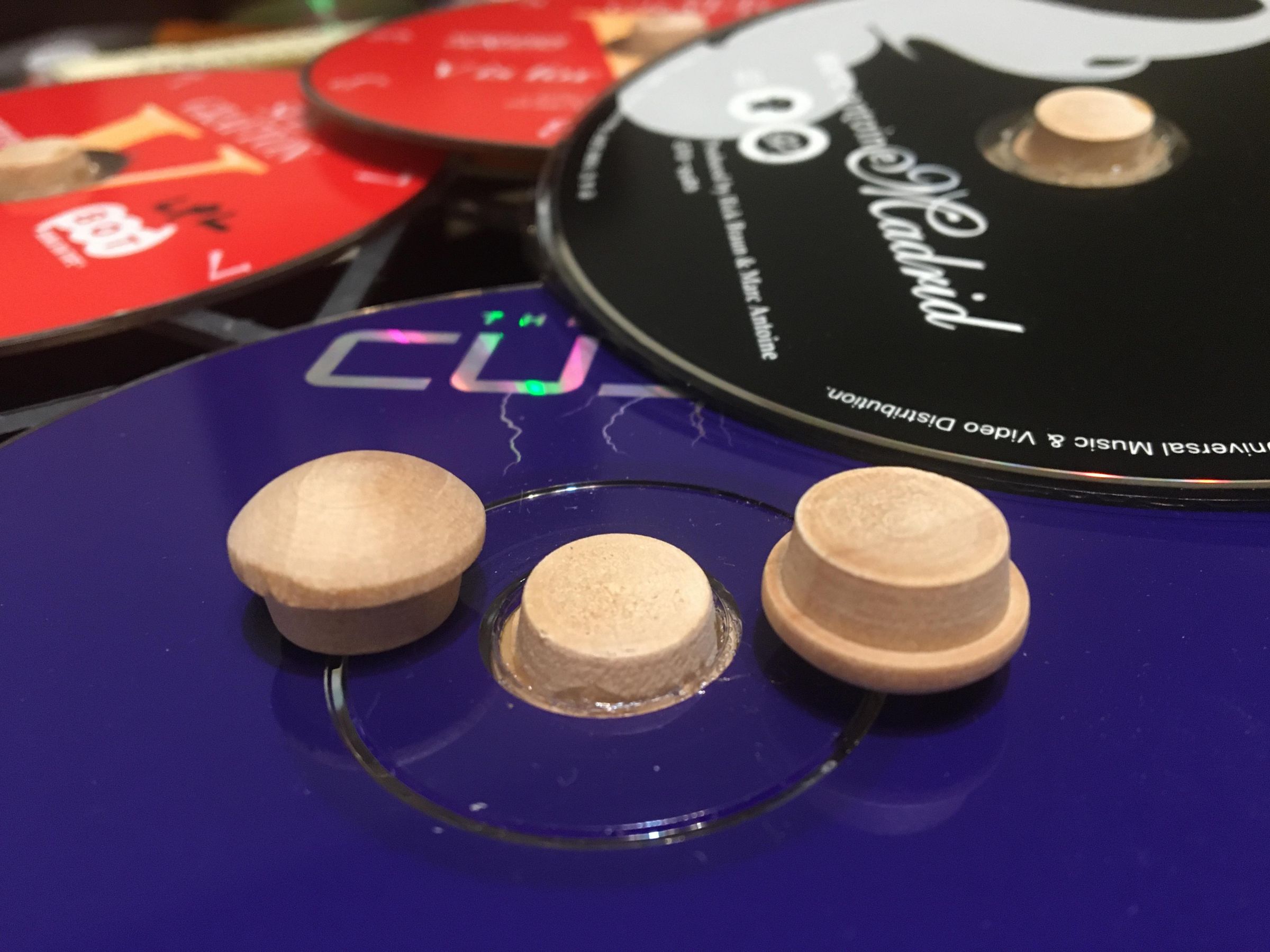 Simple 5 Minute Spin Top From a CD, a Marble or a Wood Button Plug and ...