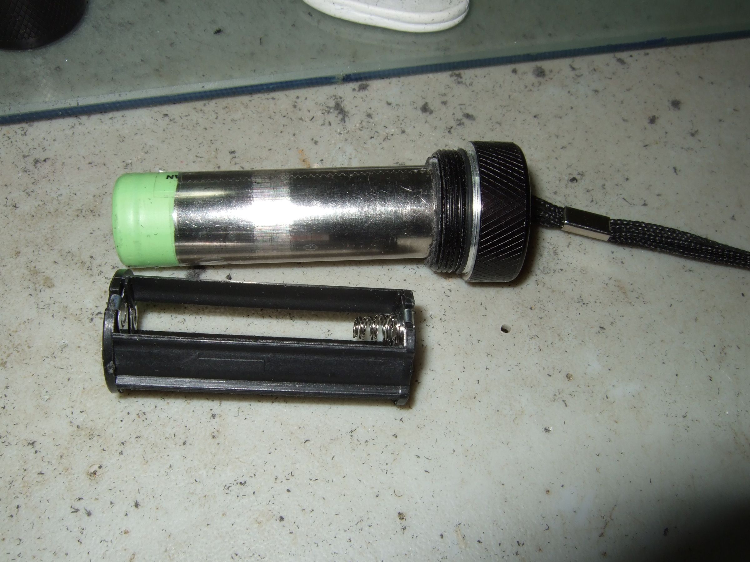 Convert a 3xAAA Flashlight to a Lithium 18650 Cell : 9 Steps - Instructables