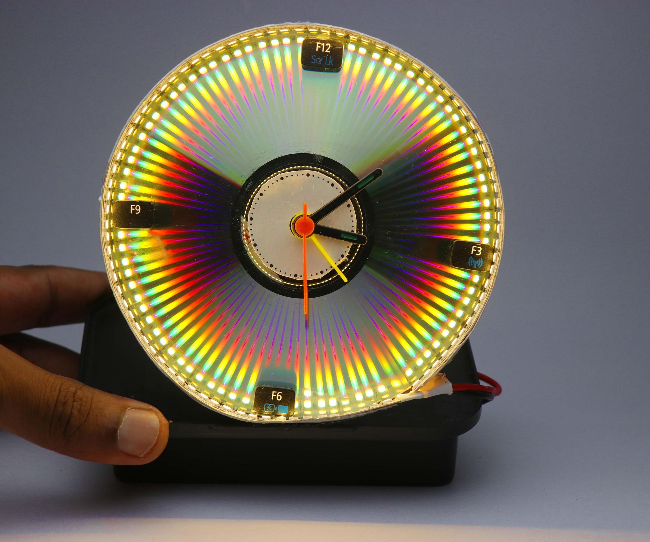 Make a Mesmerizing Light Pattern Clock by Upcycling an Old Clock and CD ...