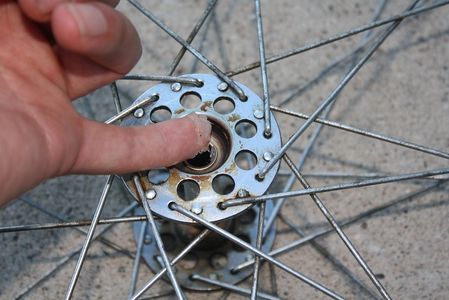 How to Rebuild a Bicycle Front Wheel Hub Using Simple Tools : 7 Steps ...
