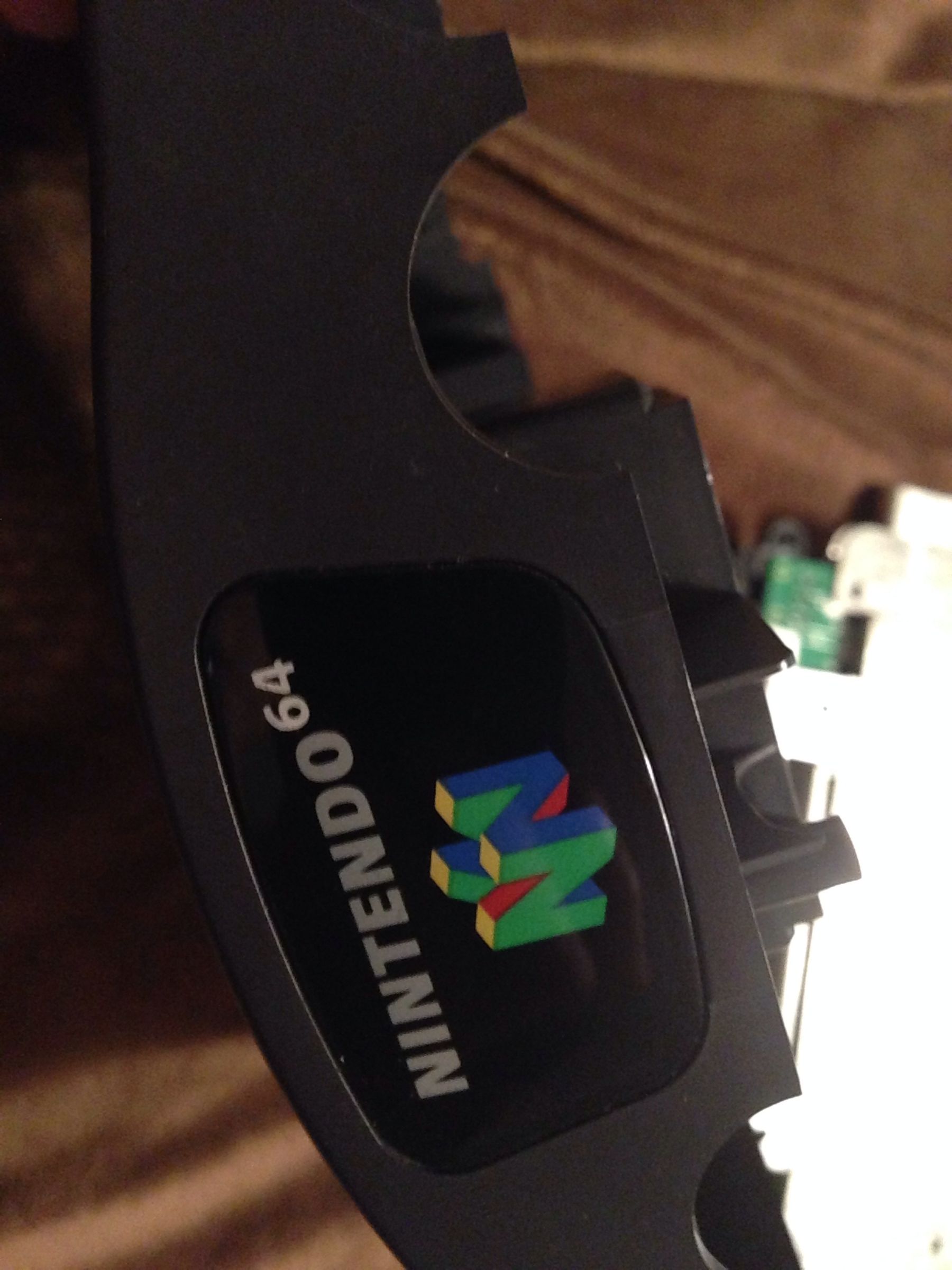 N64 LED 5v Power Source & Front Emblem Removal : 4 Steps - Instructables