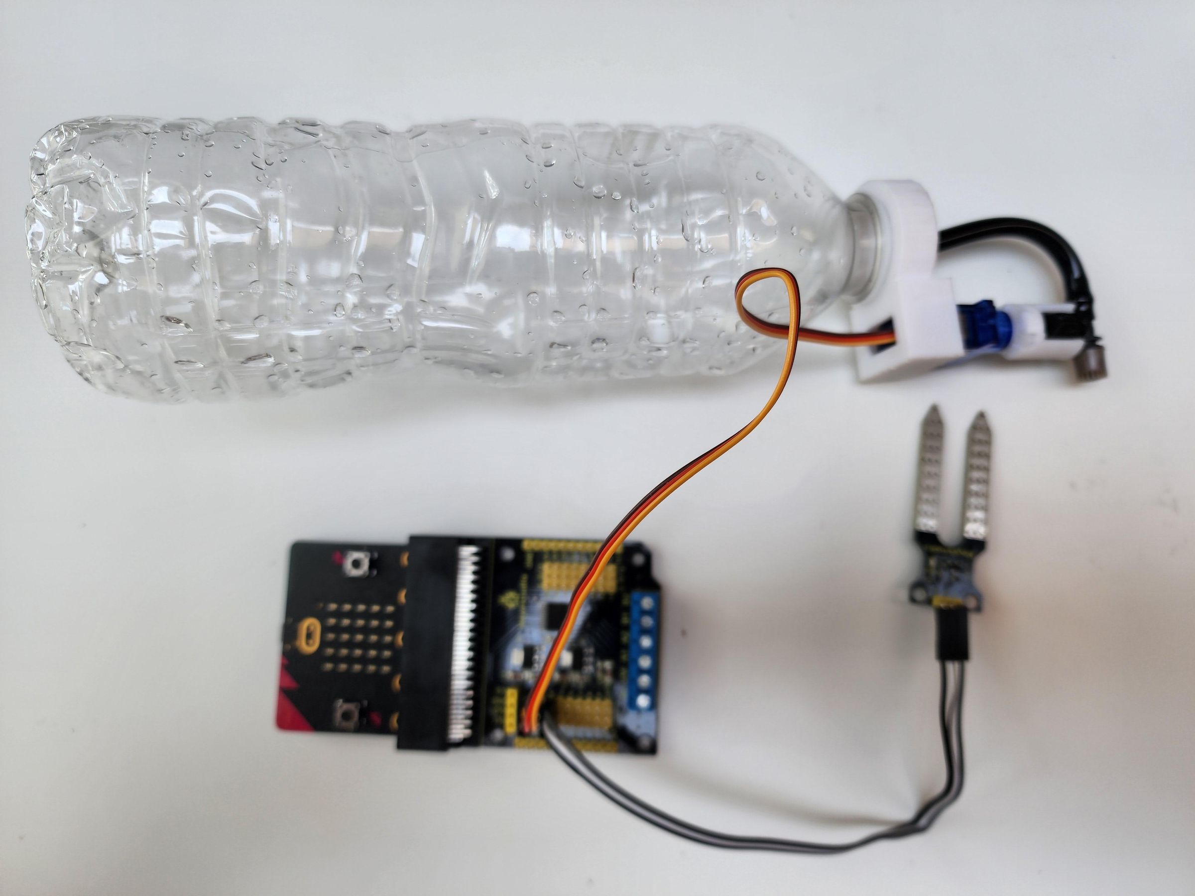Use Plastic Bottle to Make Automatic Plant Watering System. : 8 Steps ...