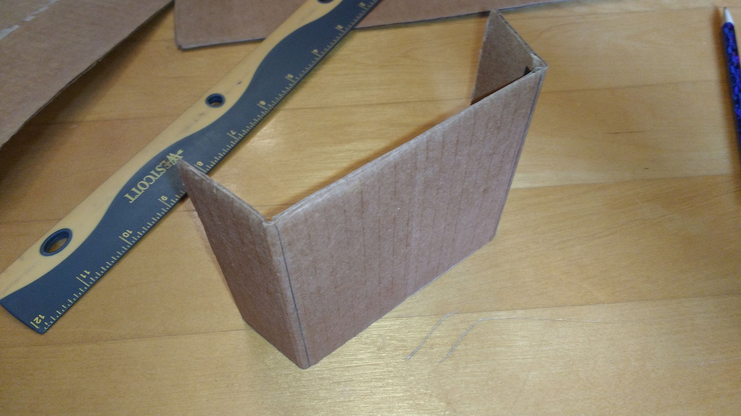 Make a Free/Inexpensive Fishing Rod Wrapping Jig Out of a Cardboard Box ...