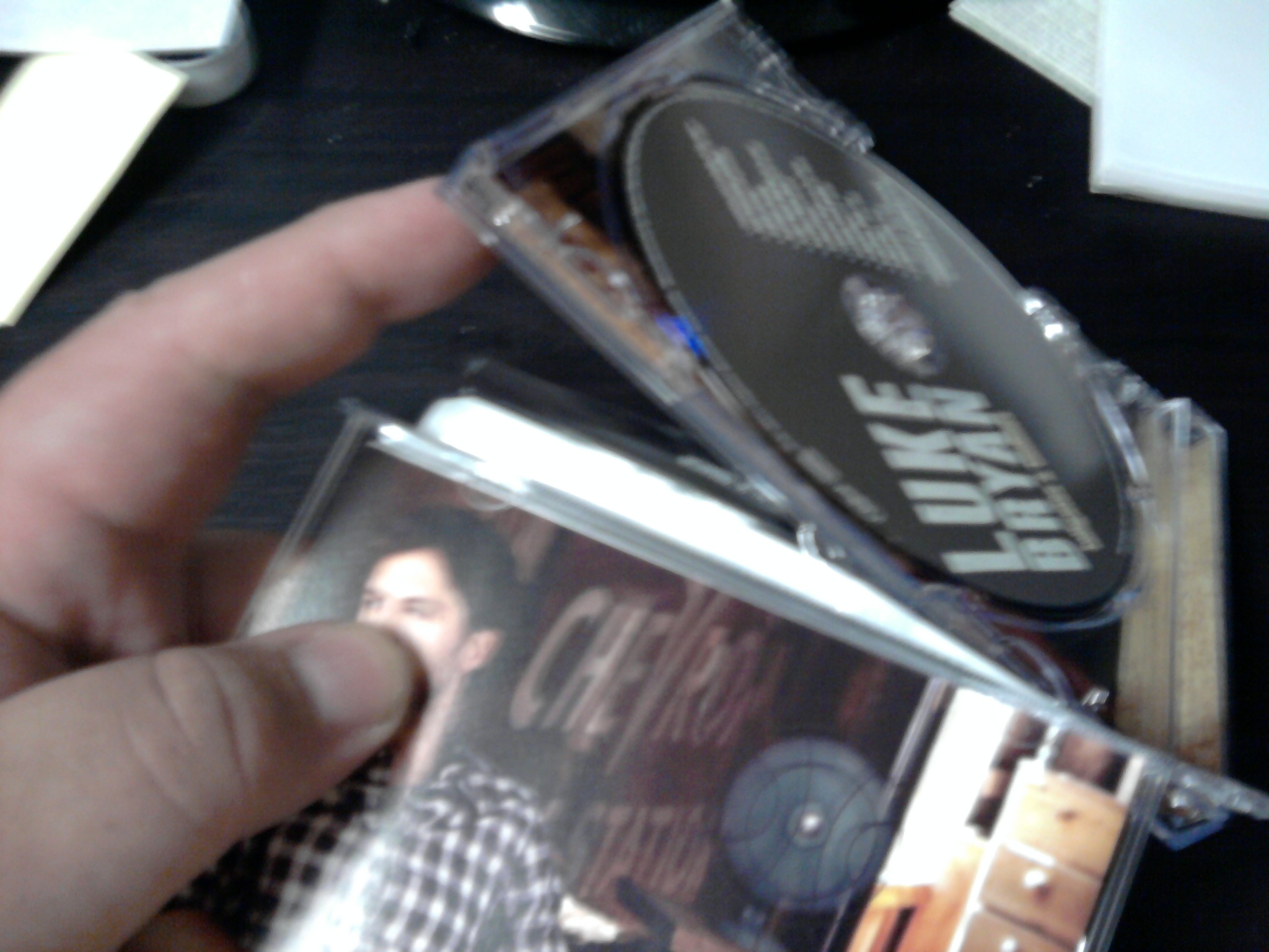 How to Open a New CD Without Any Sharp Objects : 10 Steps - Instructables