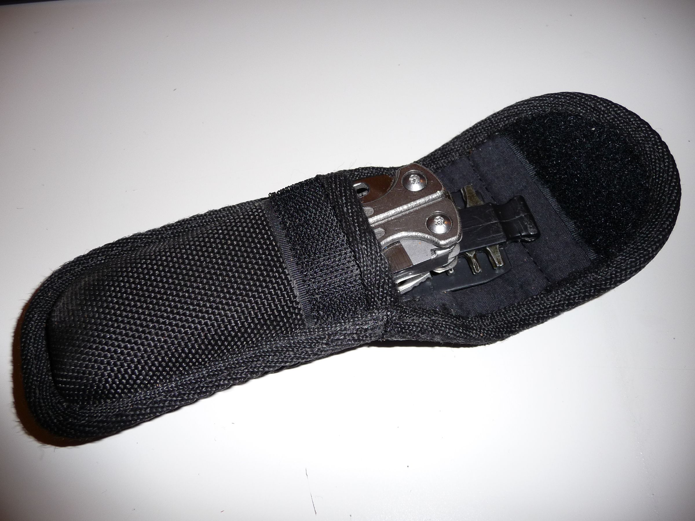 An Alternative Leatherman Sheath : 5 Steps - Instructables