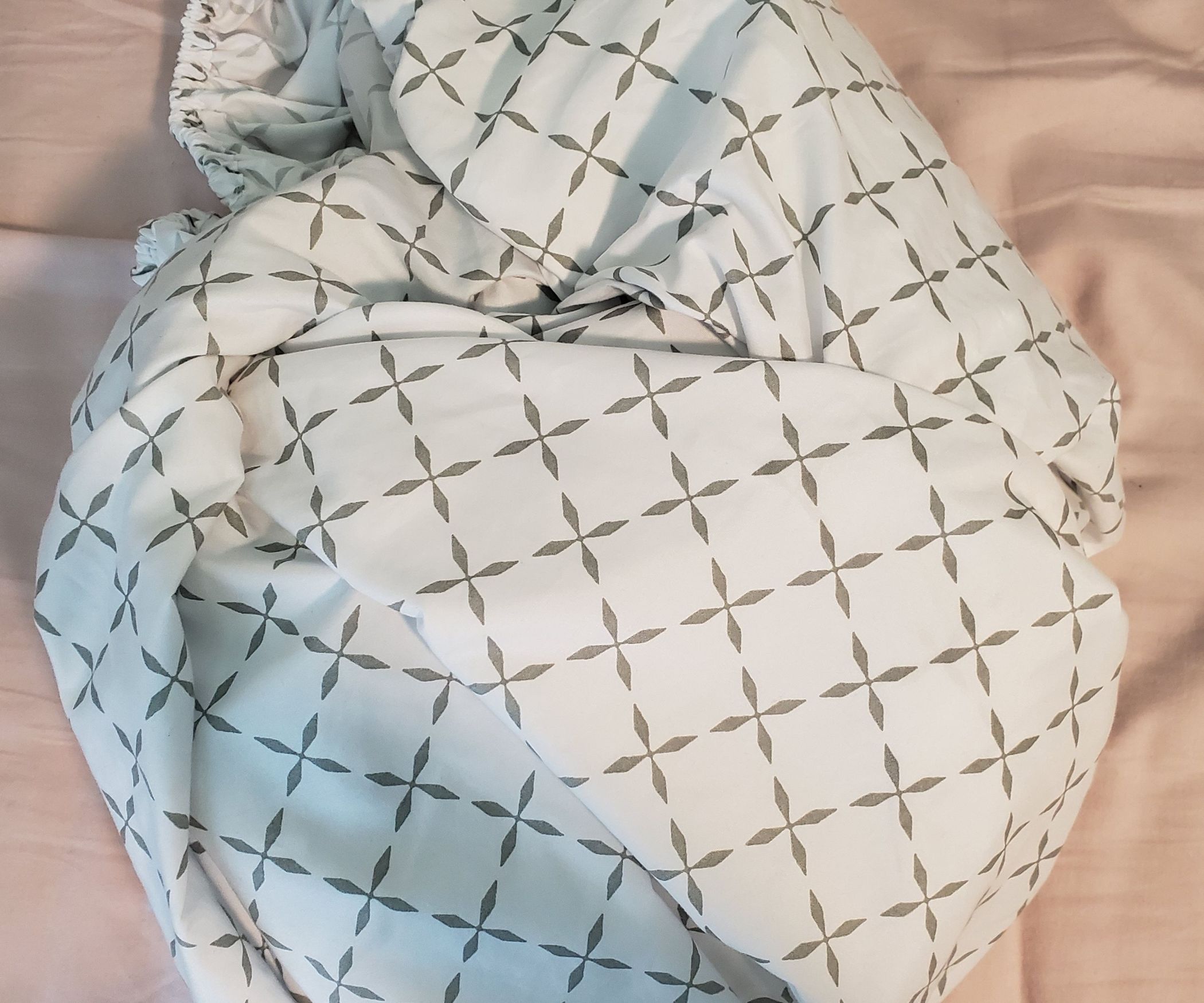 Mastering the Fold of a Fitted Sheet : 13 Steps - Instructables