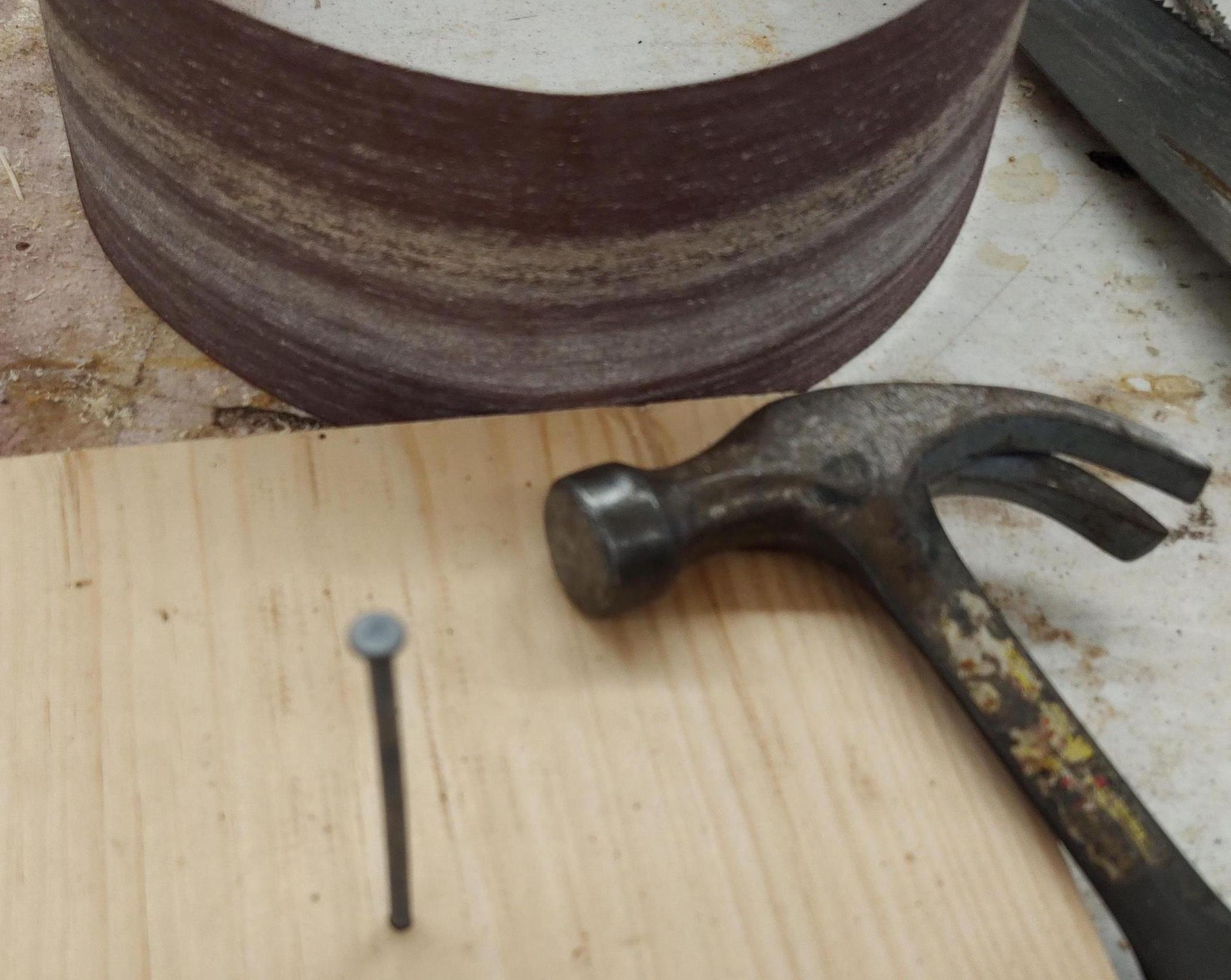 How to Hammer a Nail Into a Piece of Wood and Pry It Out : 3 Steps ...
