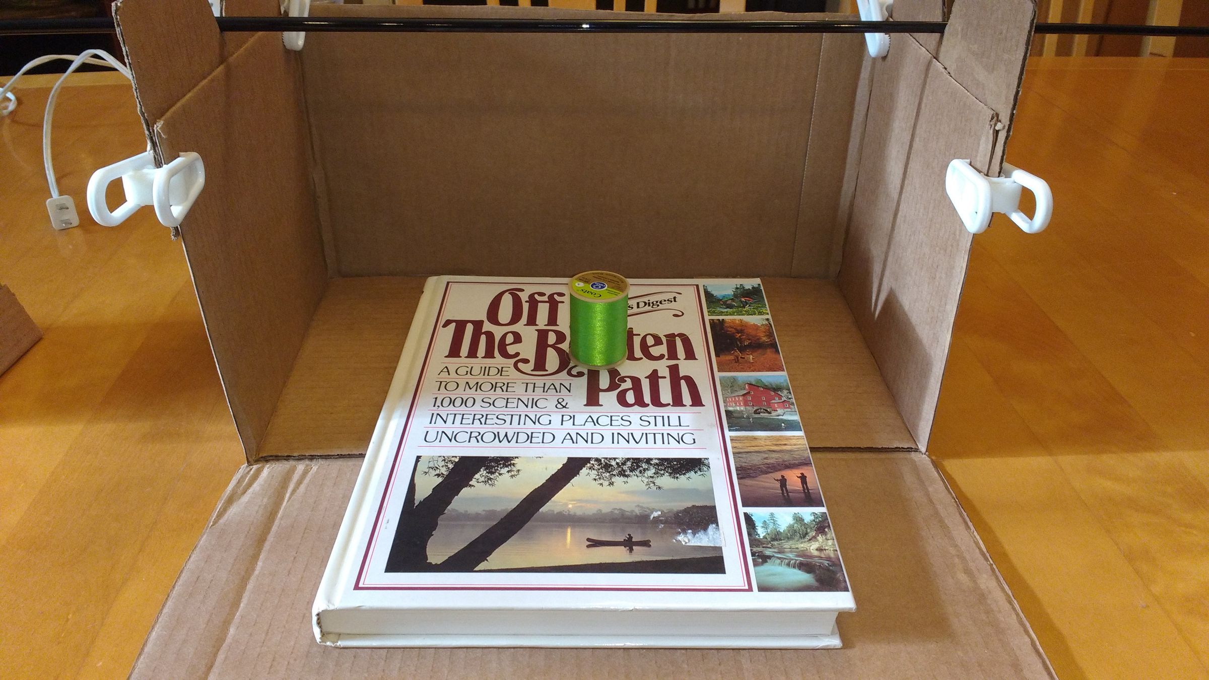 Make a Free/Inexpensive Fishing Rod Wrapping Jig Out of a Cardboard Box ...