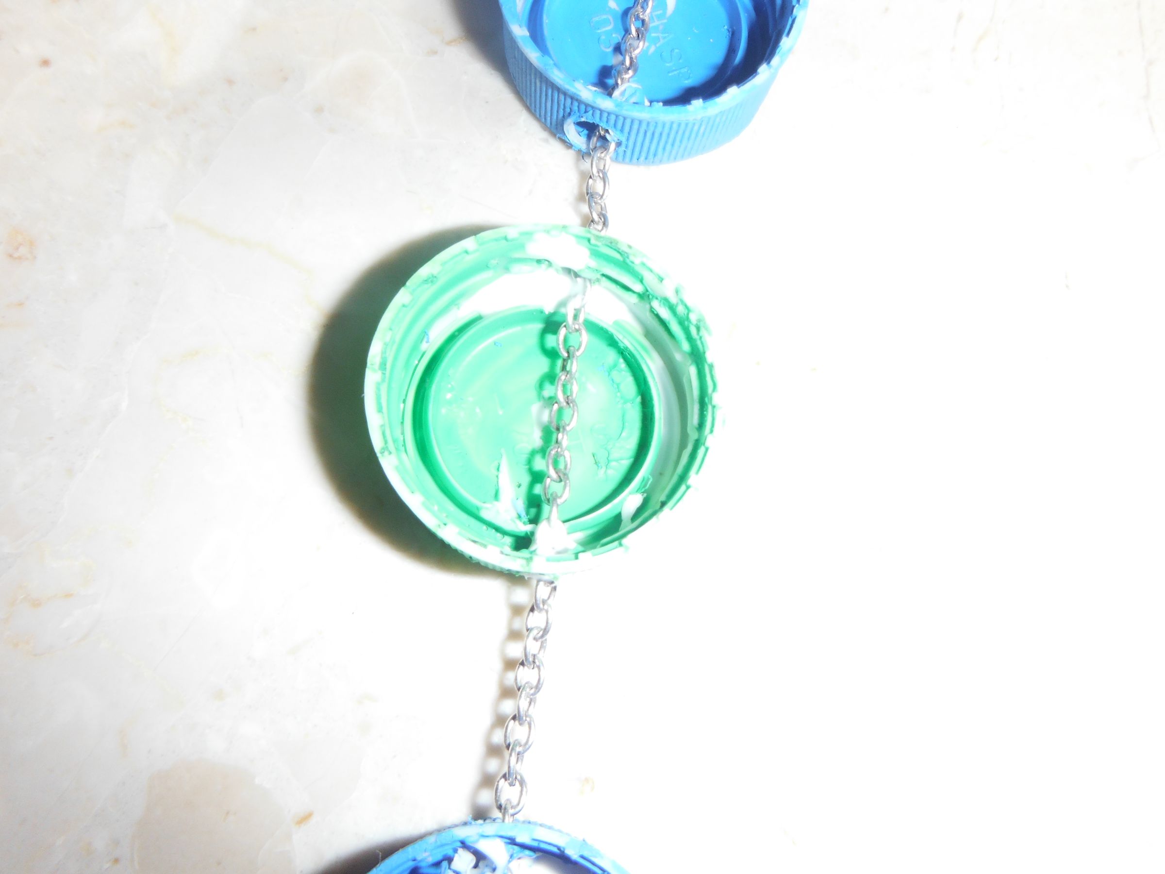 Make a Bottle Cap Necklace : 7 Steps - Instructables