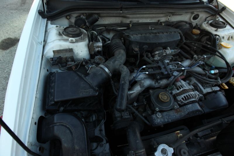 How to Check and Change a Mass Air Flow Sensor for a 1999 Subaru ...