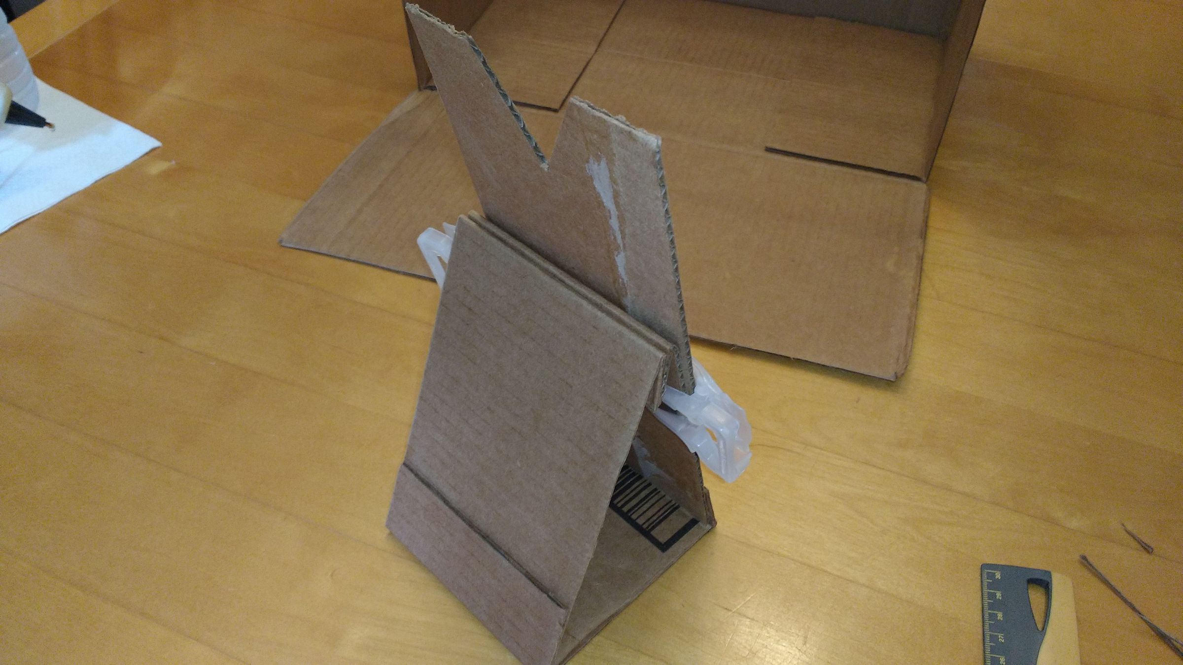 Make a Free/Inexpensive Fishing Rod Wrapping Jig Out of a Cardboard Box ...