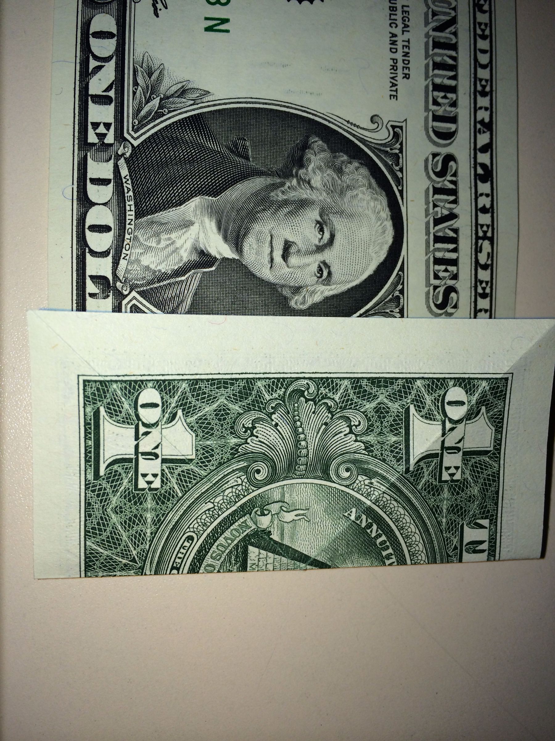 Dollar Origami Heart Holding Quarter : 11 Steps - Instructables