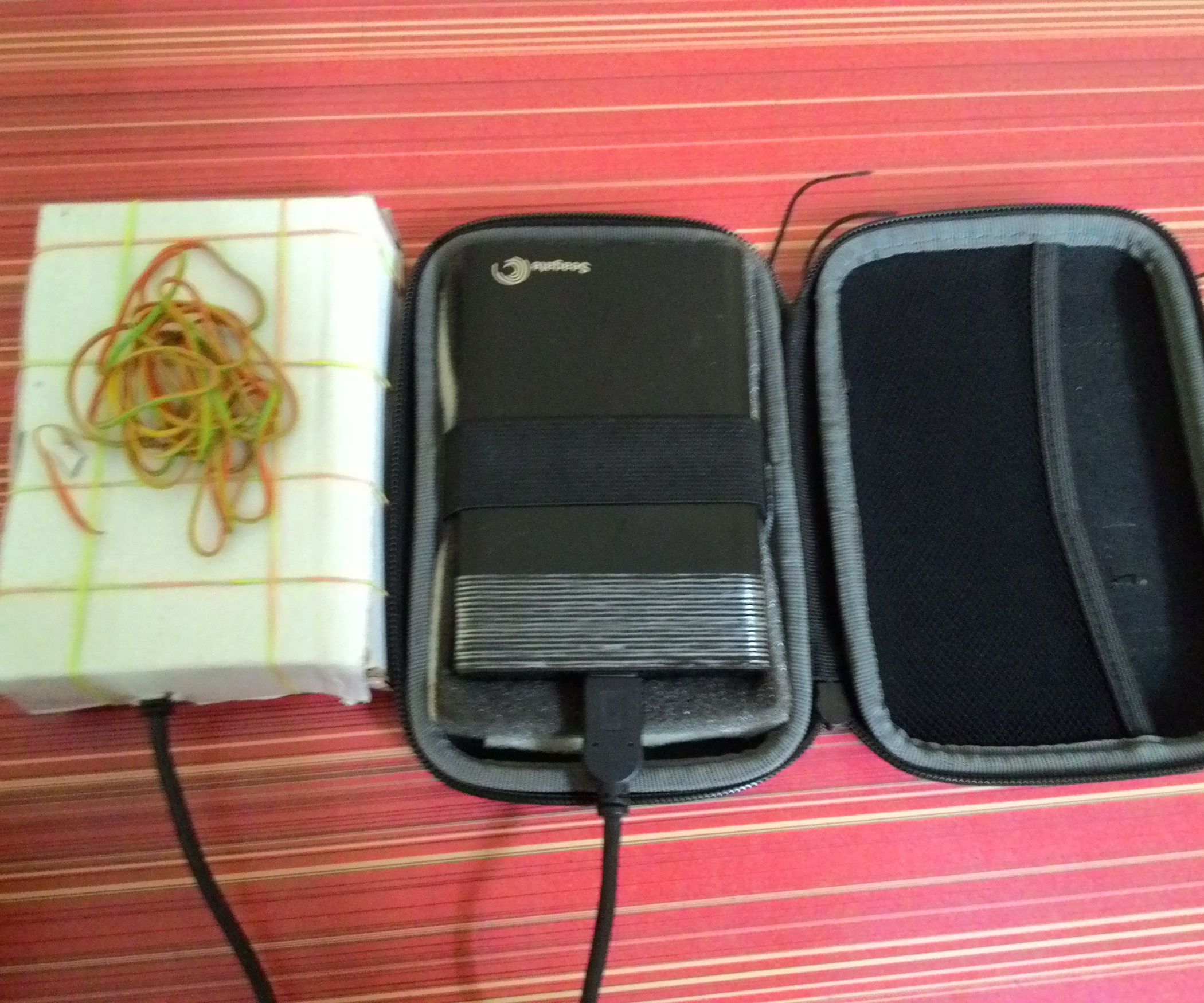 Rubber Band Challenge:- HARD DISK CASE : 4 Steps - Instructables