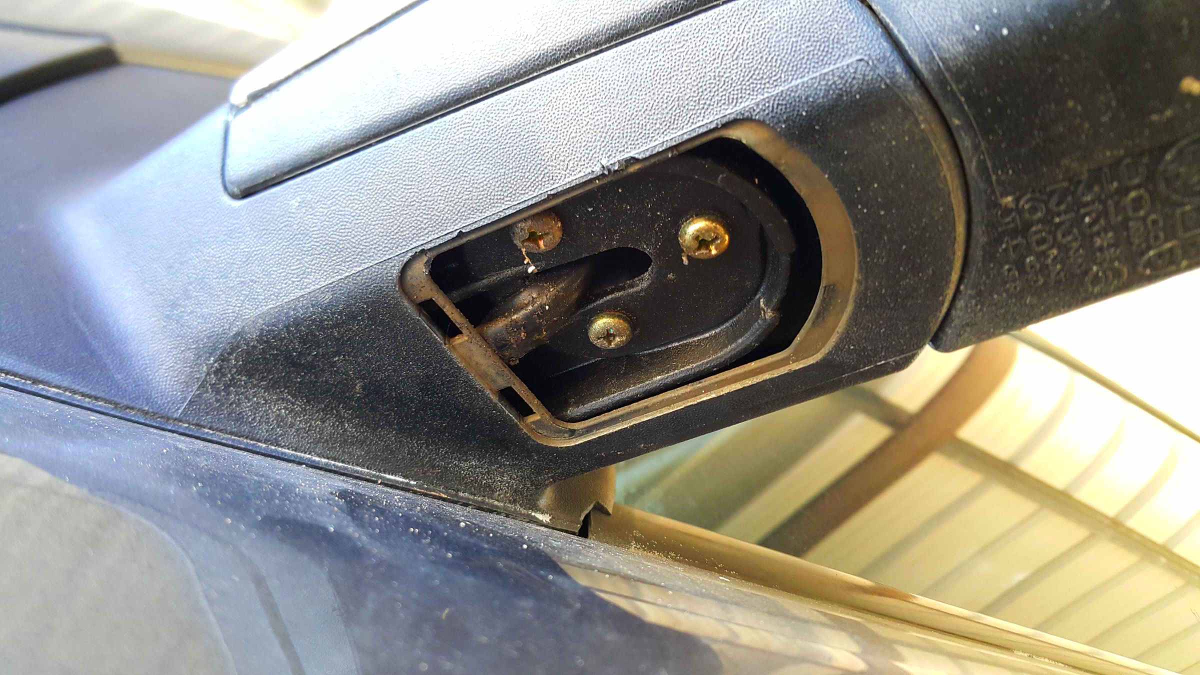 Tightening a Loose Side Mirror. - Instructables