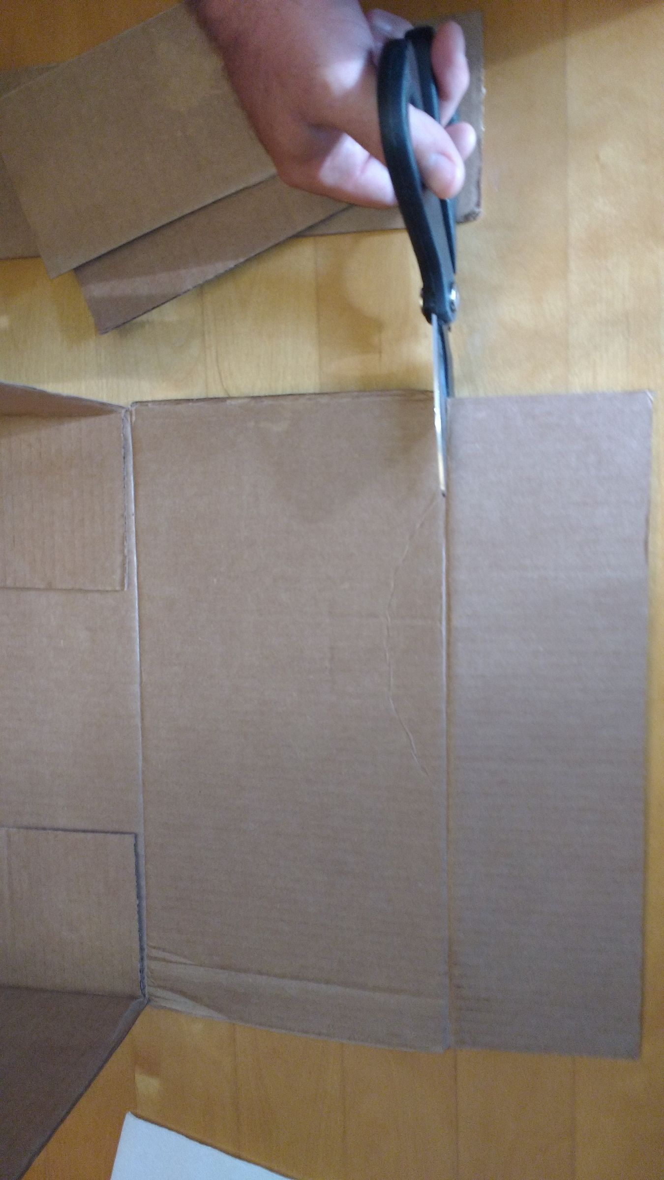 Make a Free/Inexpensive Fishing Rod Wrapping Jig Out of a Cardboard Box ...