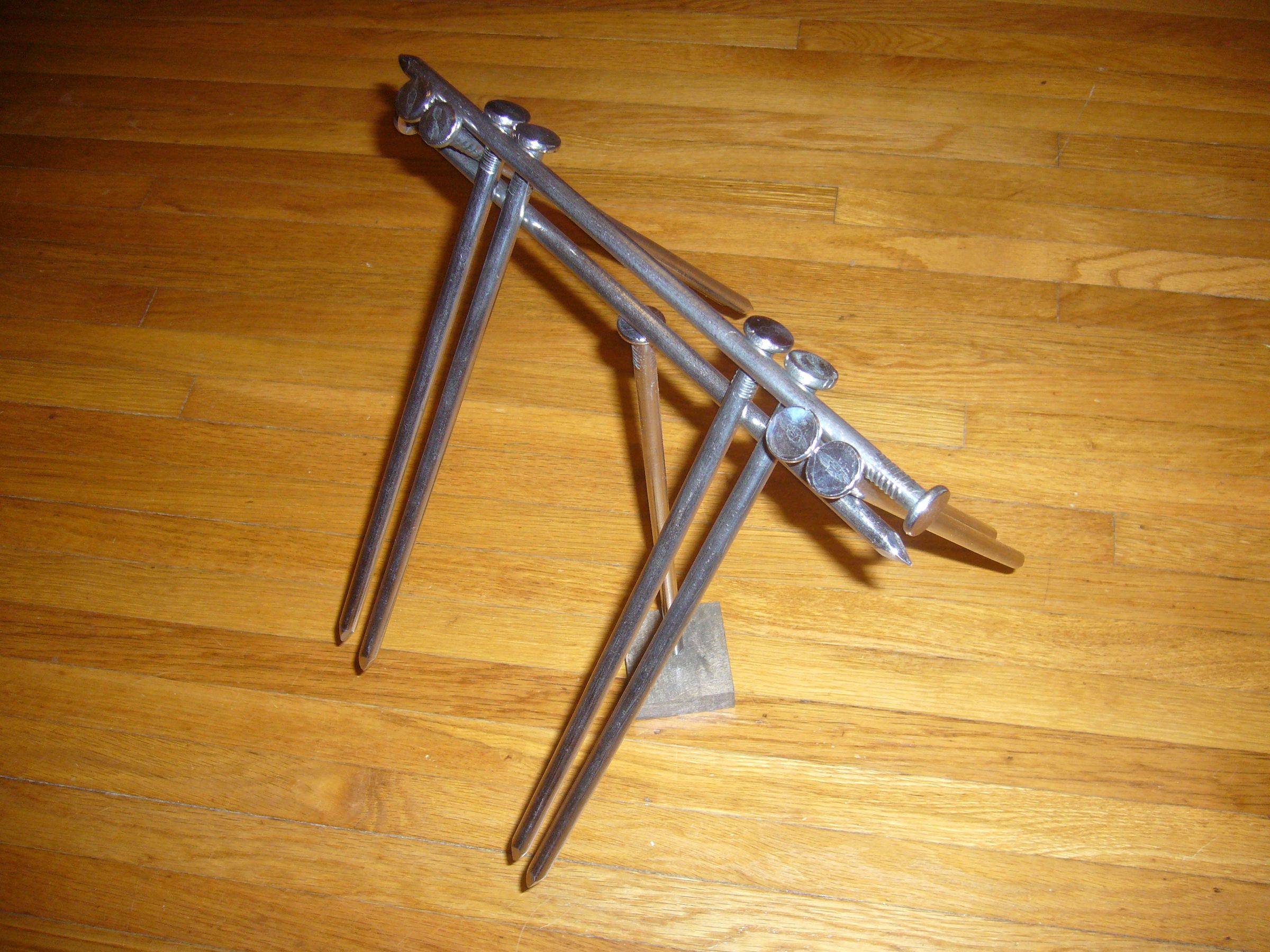 Balance 10 Nails on One Nail : 8 Steps - Instructables