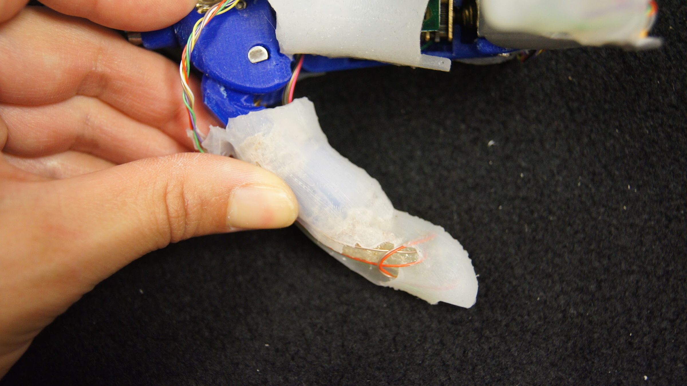 Compliant Prosthetic Hand With Sensorimotor Control and Sensory ...