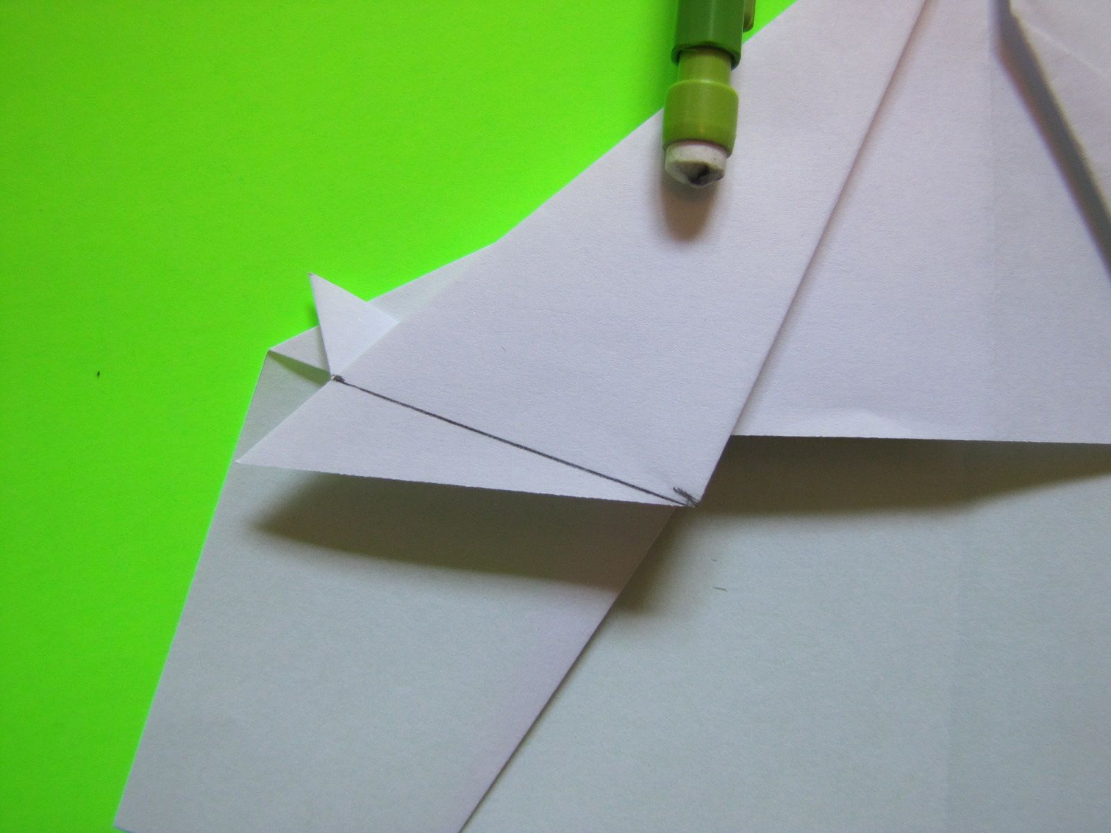 How to Make the Delta-Fighter Paper Plane : 12 Steps - Instructables