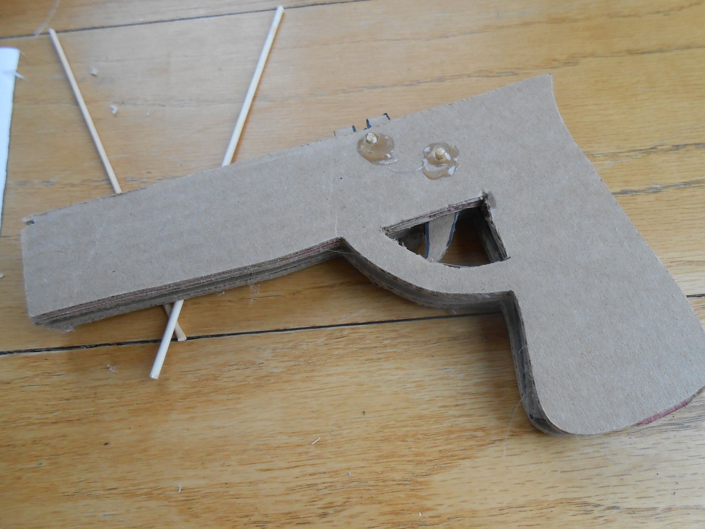 Cardboard Rubberband Gun : 4 Steps - Instructables