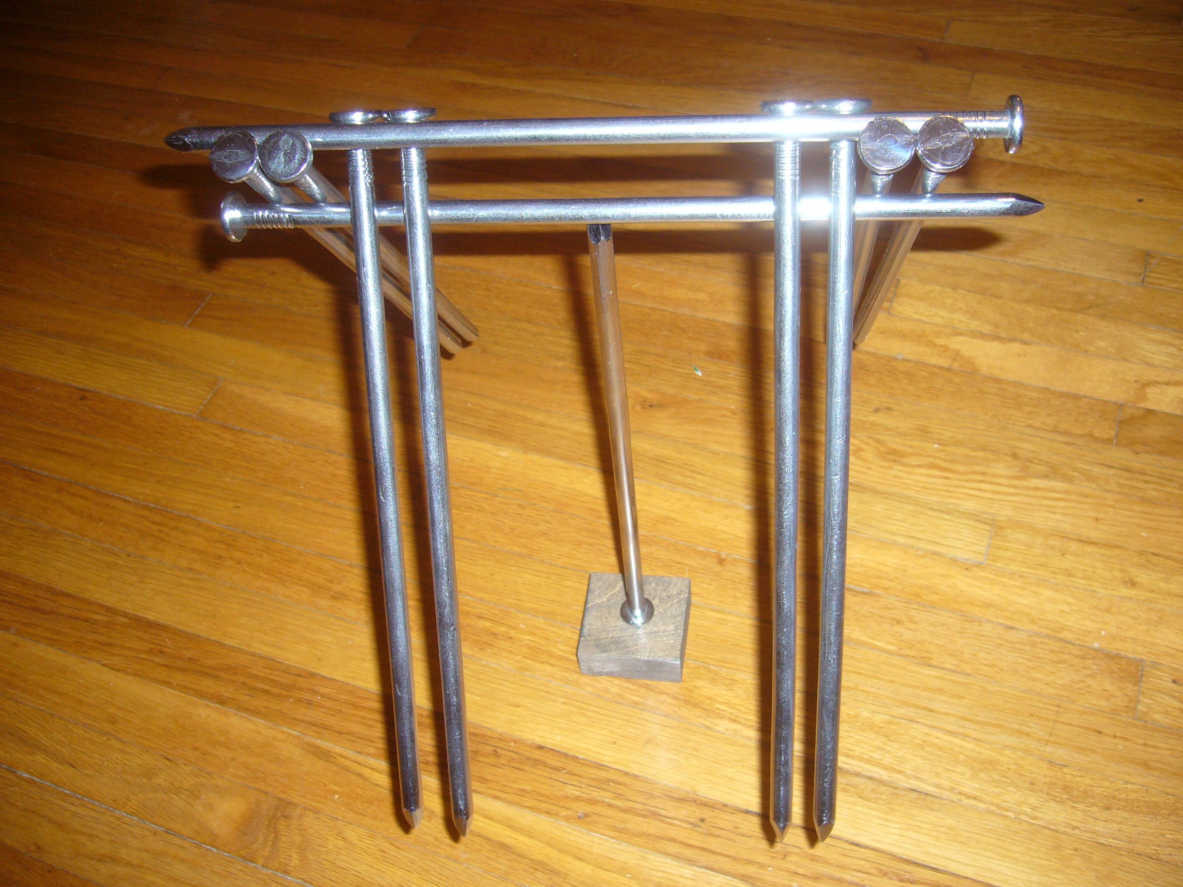 Balance 10 Nails on One Nail : 8 Steps - Instructables