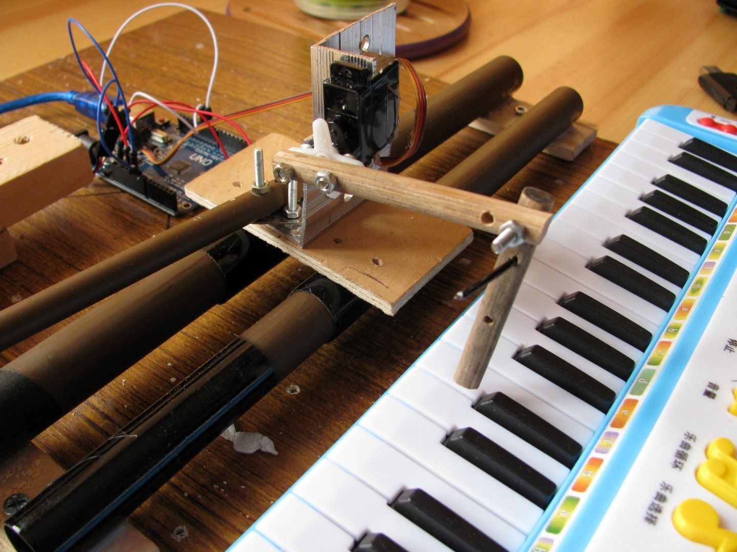 GitHub - Shridatha08/Robot-Musician: A simple robotic one finger piano ...