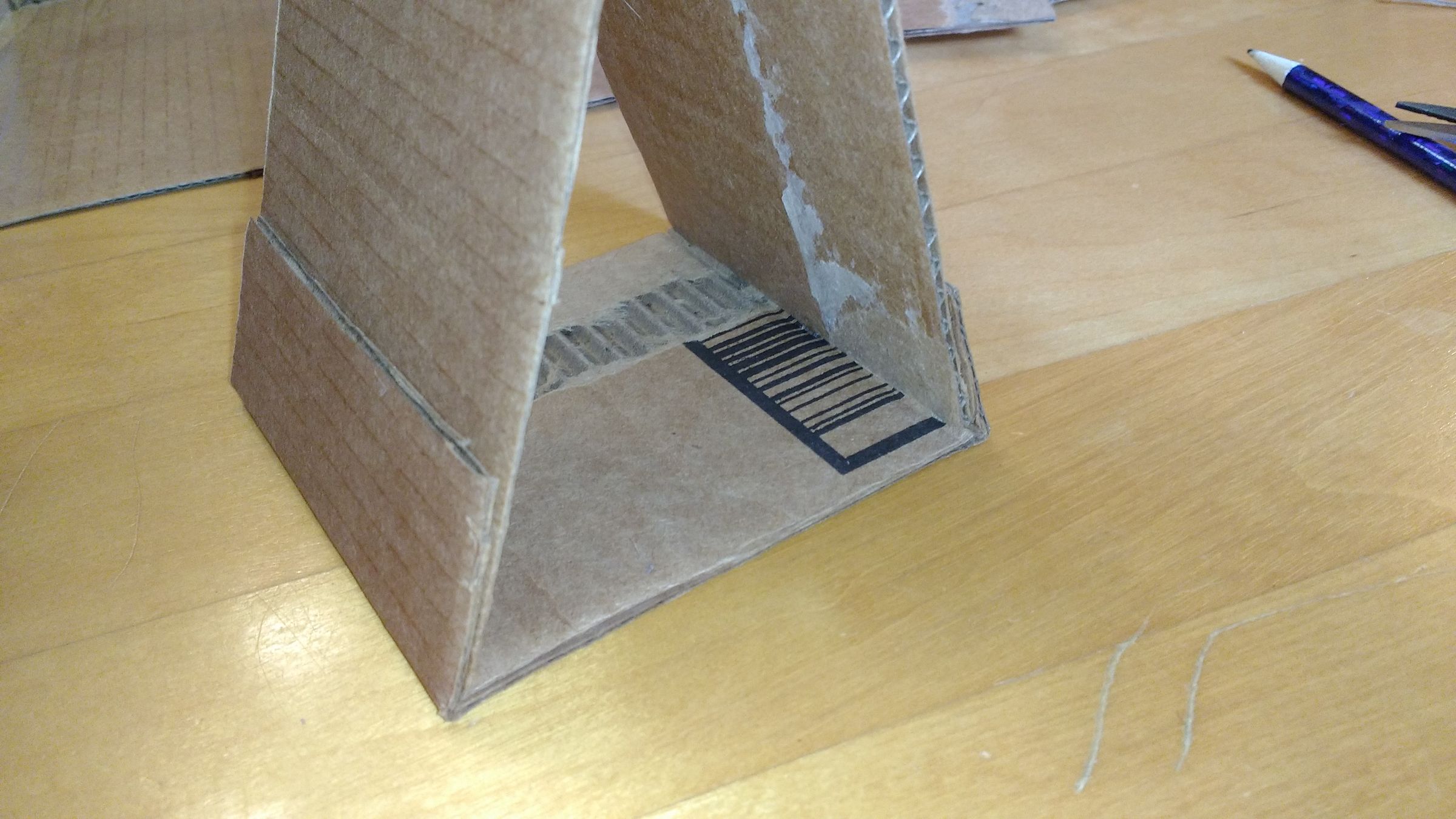 Make a Free/Inexpensive Fishing Rod Wrapping Jig Out of a Cardboard Box ...