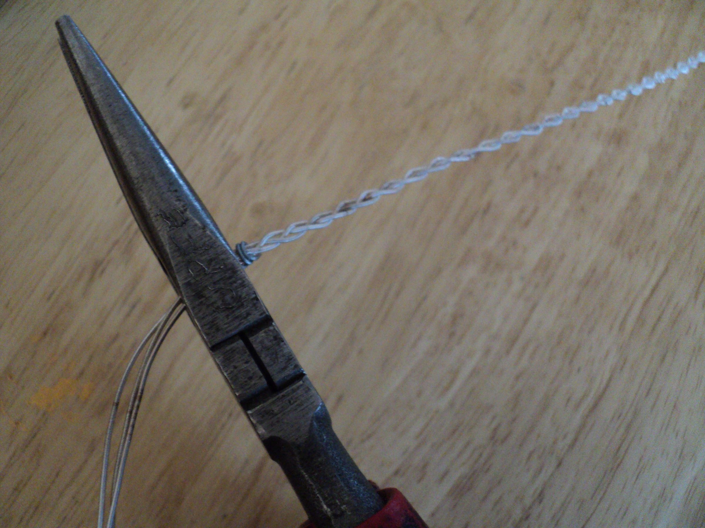 Make a Bracelet Out of Used Guitar Strings. : 8 Steps - Instructables