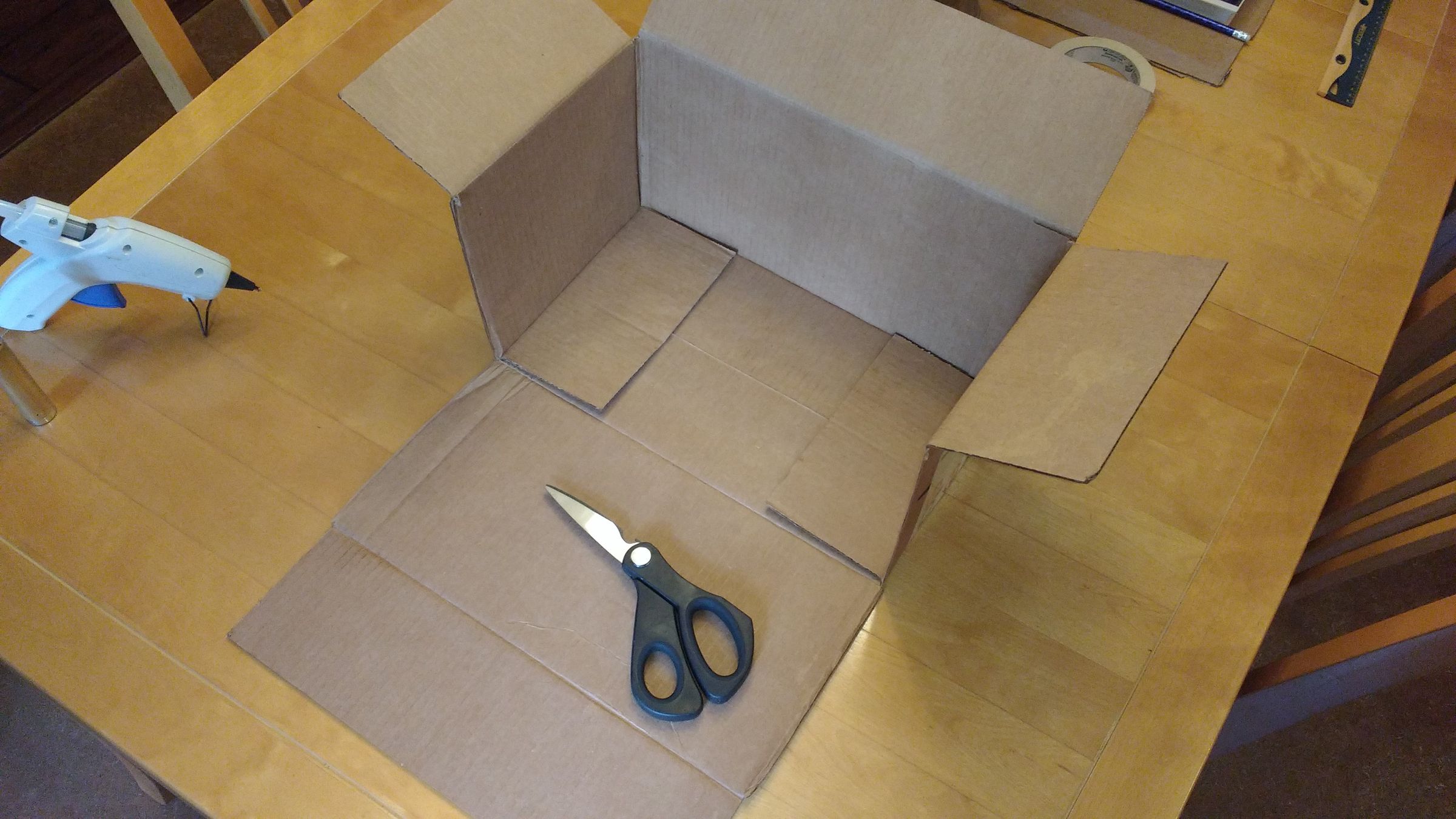 Make a Free/Inexpensive Fishing Rod Wrapping Jig Out of a Cardboard Box ...