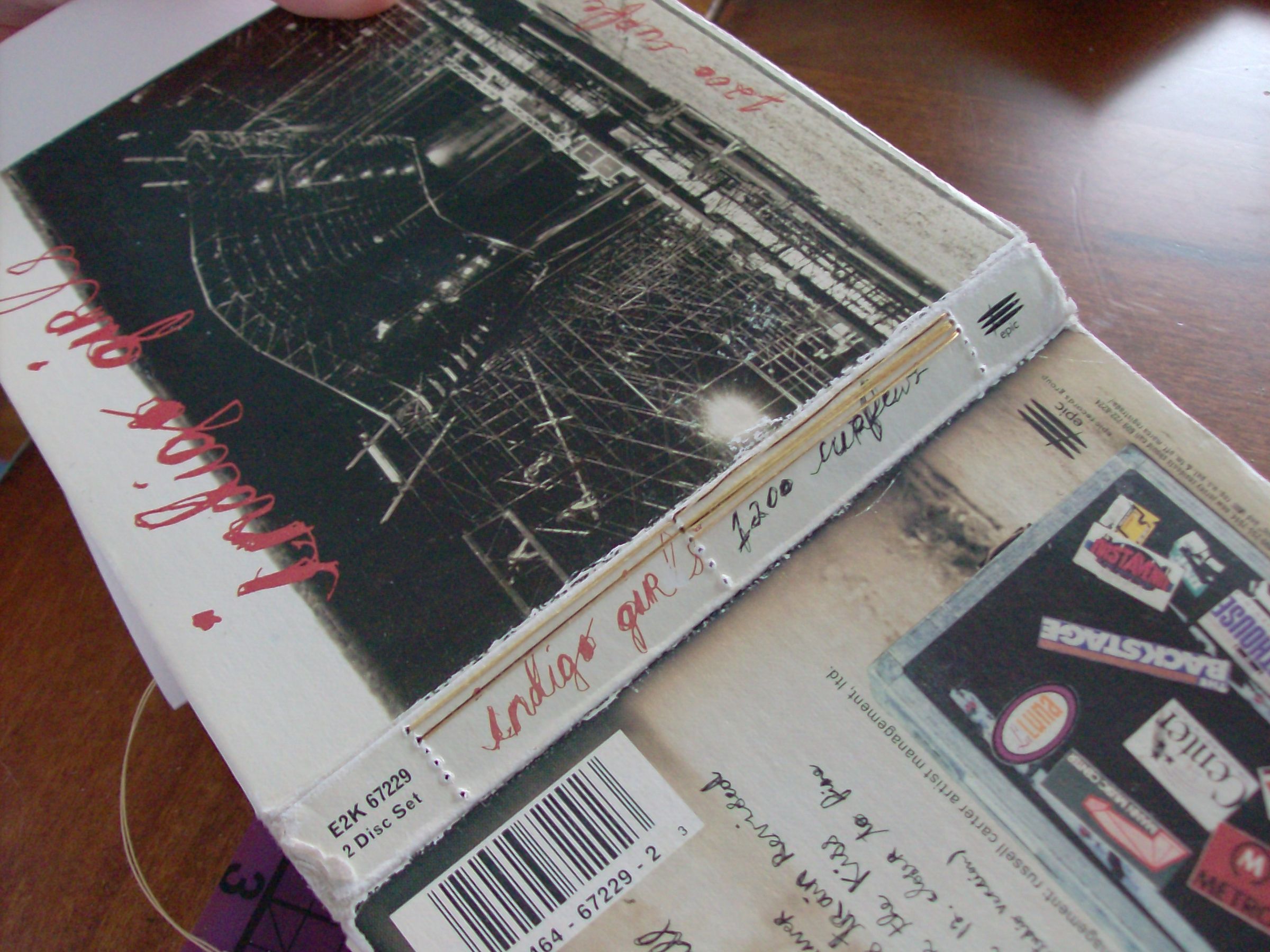 Upcycle Your Old CD Covers : 6 Steps - Instructables