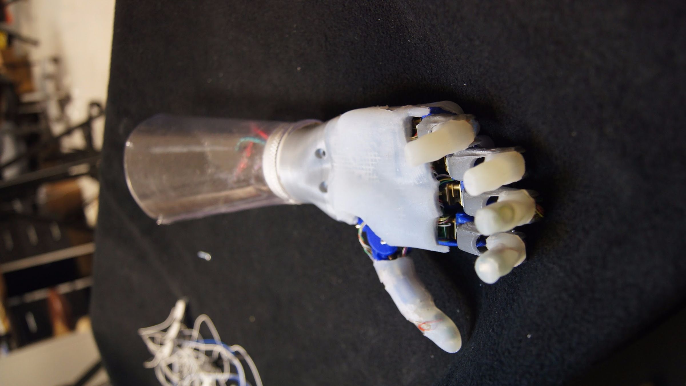 Compliant Prosthetic Hand With Sensorimotor Control and Sensory ...