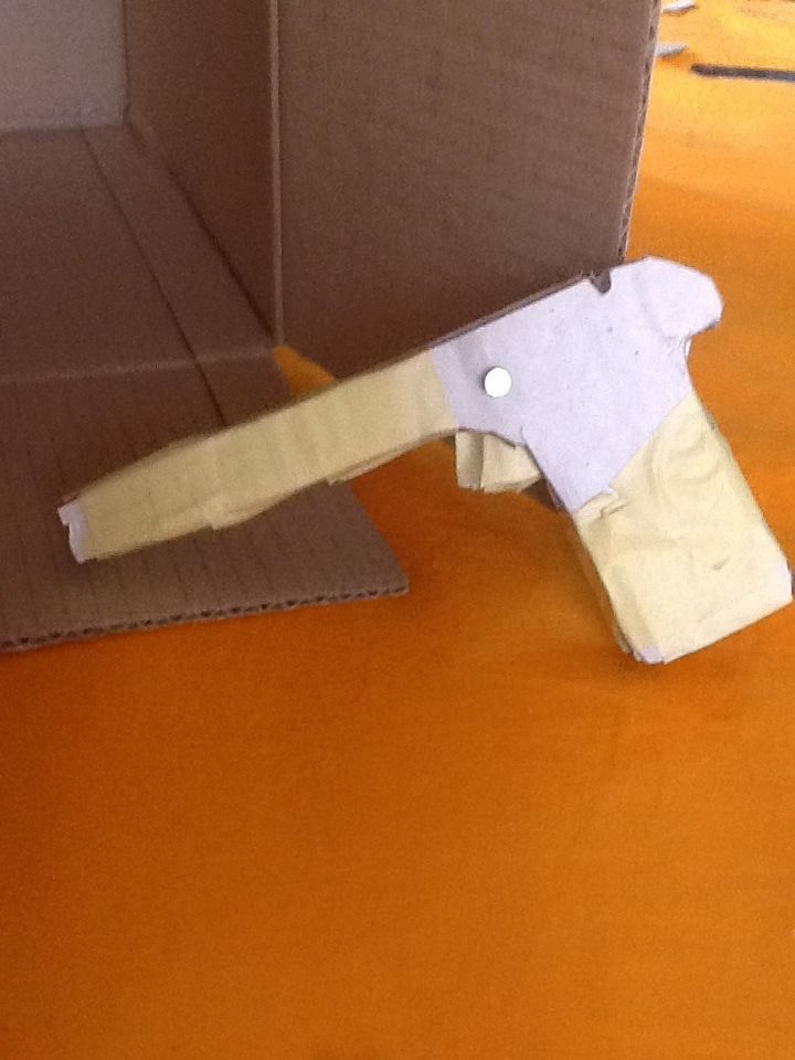 the rubber band cardboard gun DIY Project to Discover - FindingDIY